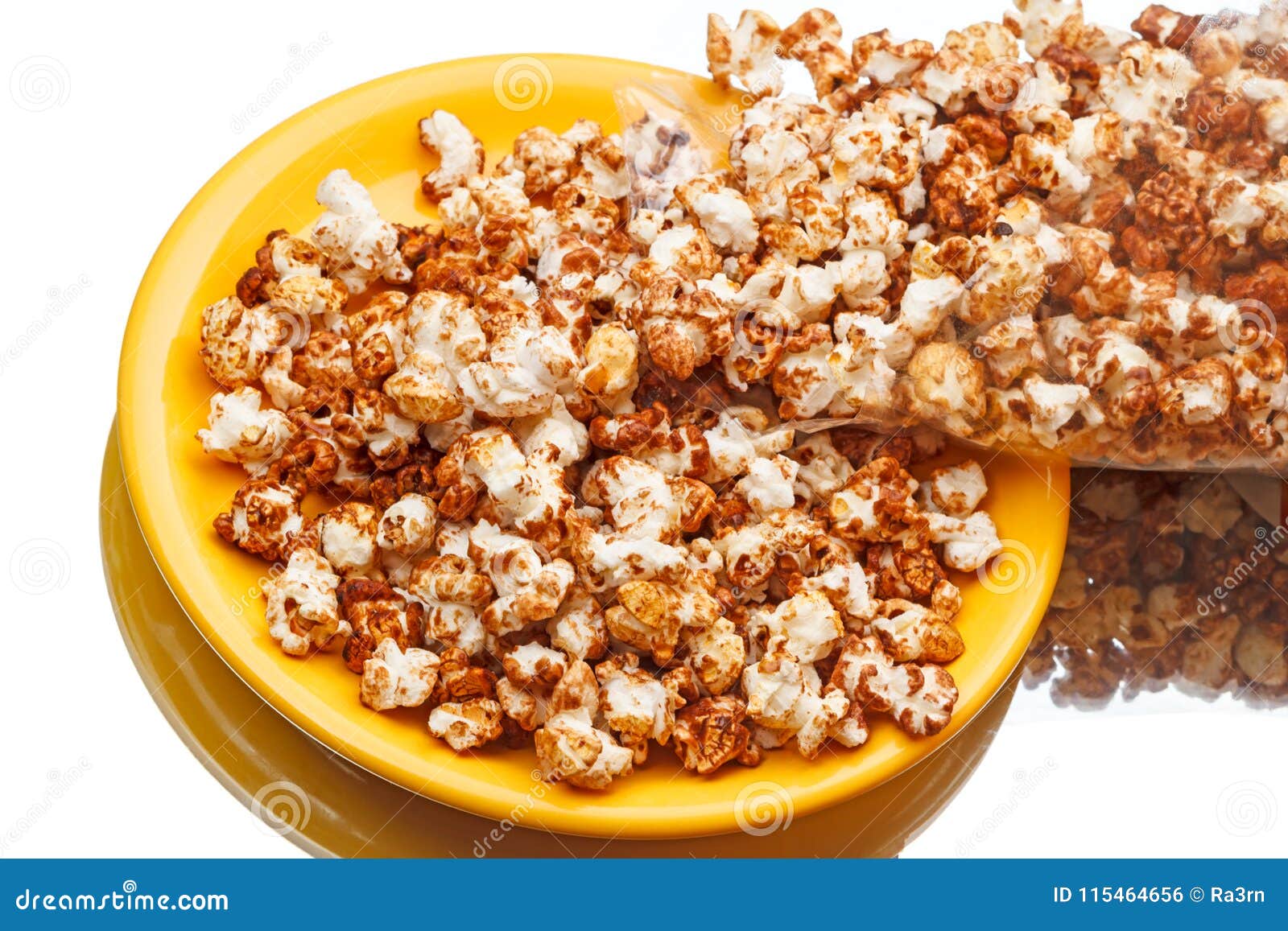 Popcorn in a Package and on a Yellow Plate Stock Photo - Image of large ...