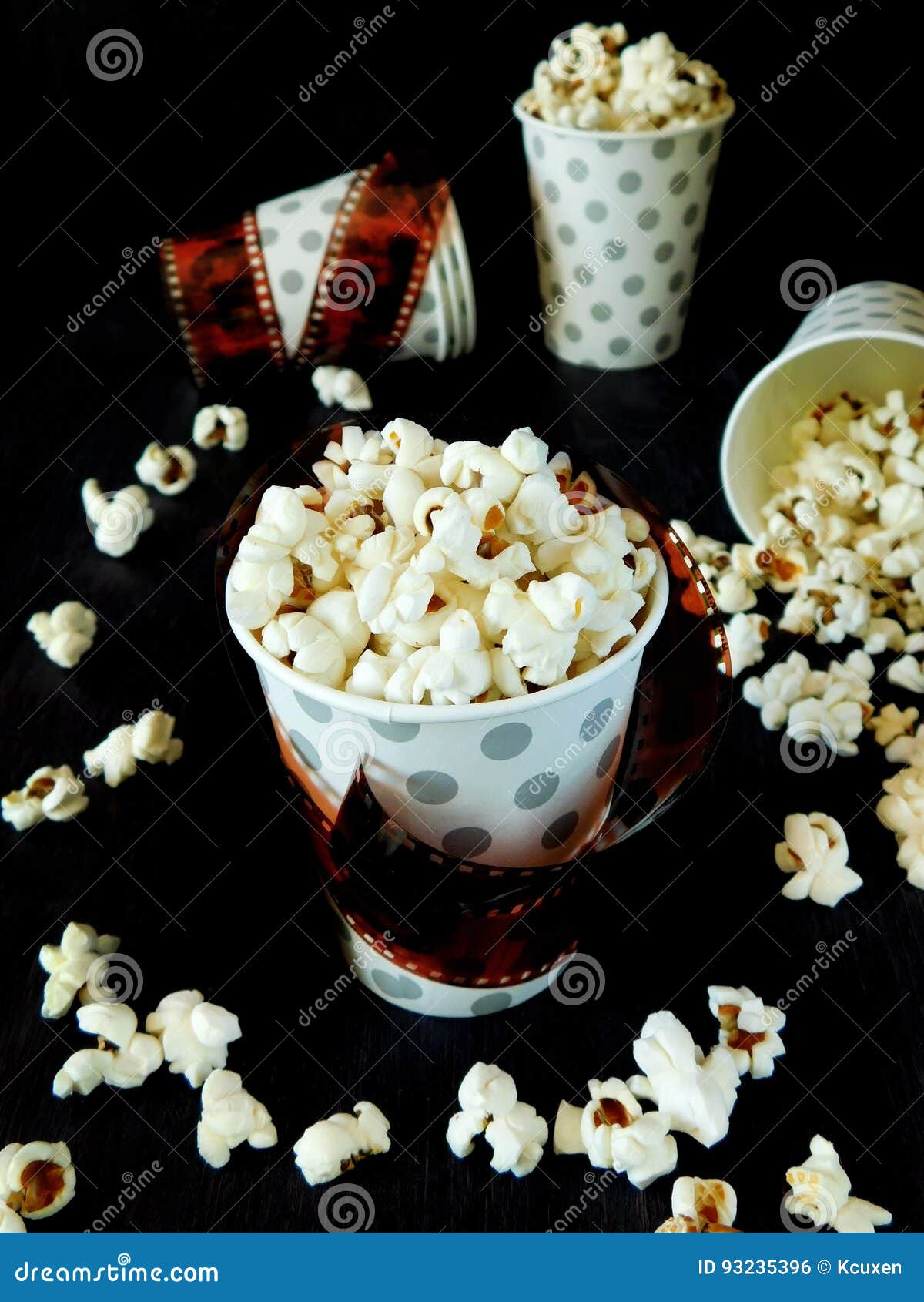 Popcorn in paper cups stock photo. Image of adding, crisps - 93235396
