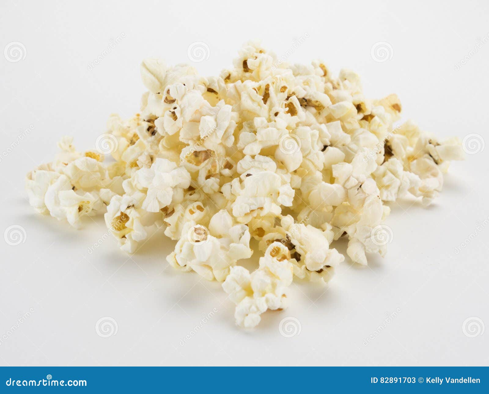 Popcorn Pile on White stock image. Image of buttered - 82891703