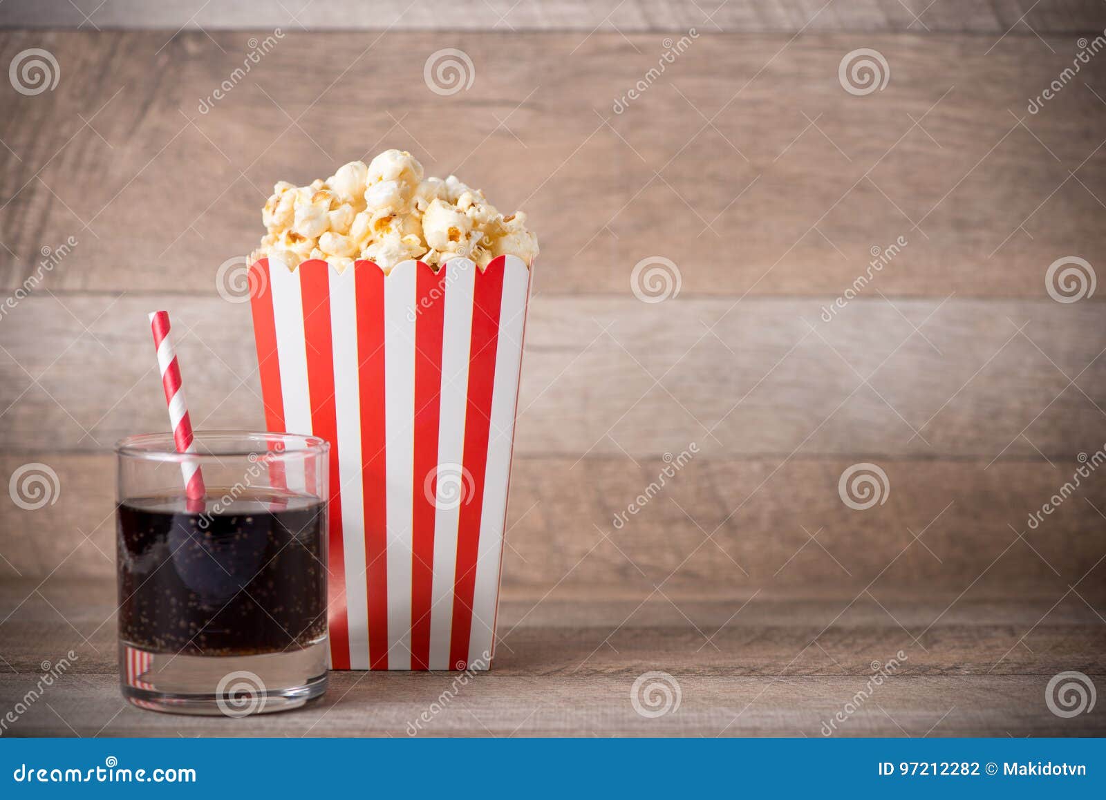 Popcorn in Red and White Cardboard with Soda on Wooden Table. Stock ...