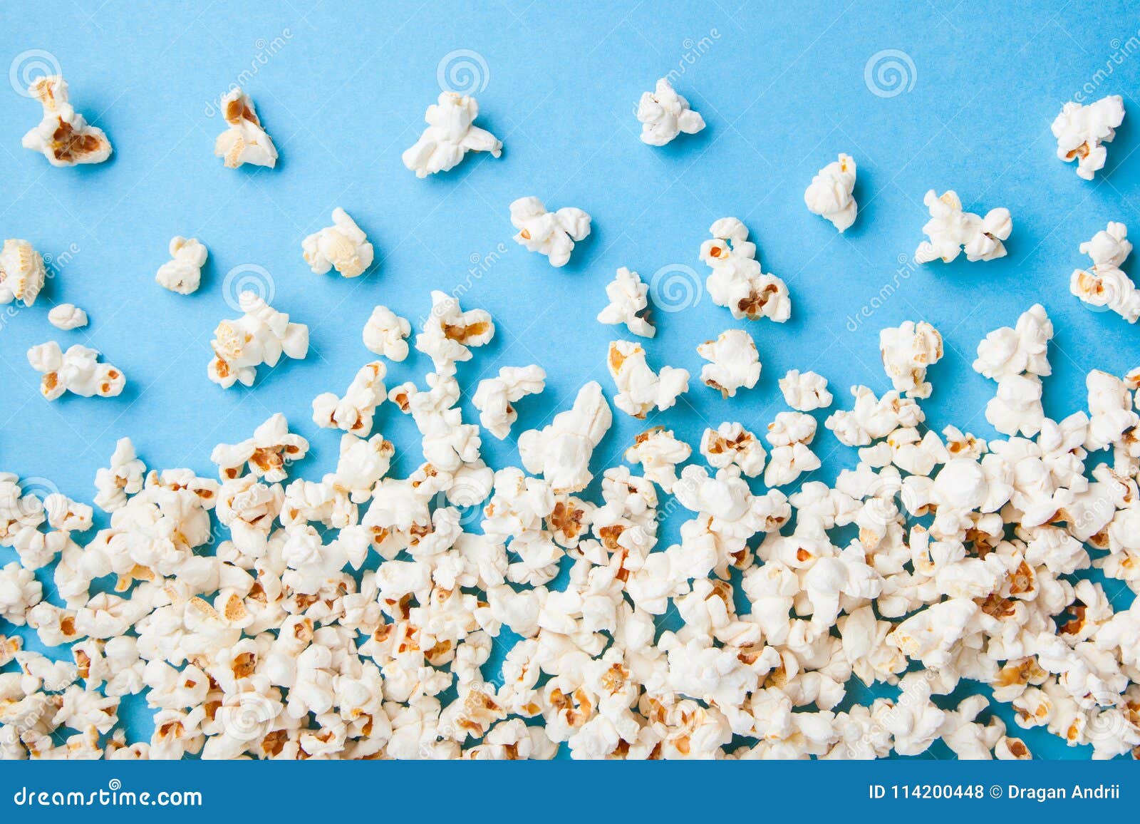 Popcorn Scattered On The Table Stock Image | CartoonDealer.com #249910171