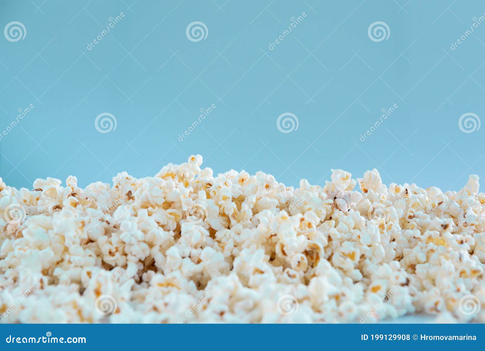 Popcorn Texture On A Blue Background Stock Photo | CartoonDealer.com ...