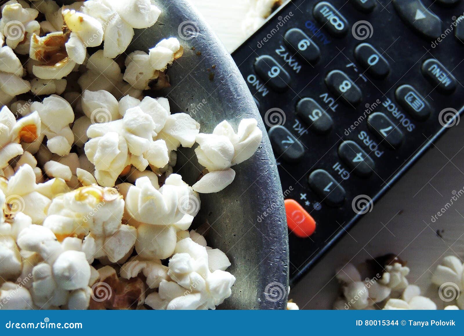 Popcorn and the TV remote stock photo. Image of fluffy - 80015344