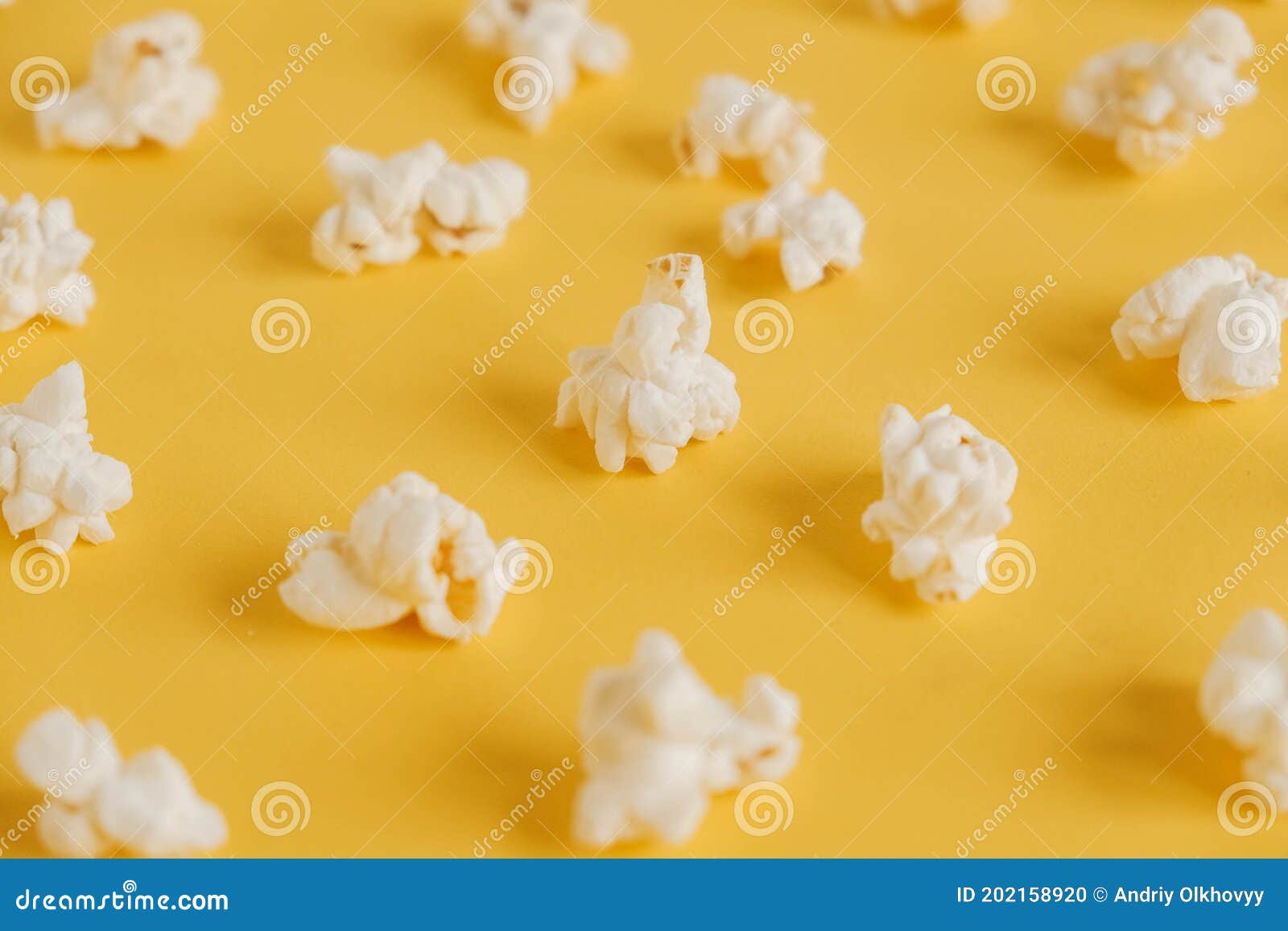 Popcorn on a Yellow Background As a Background Image. Top View Stock ...