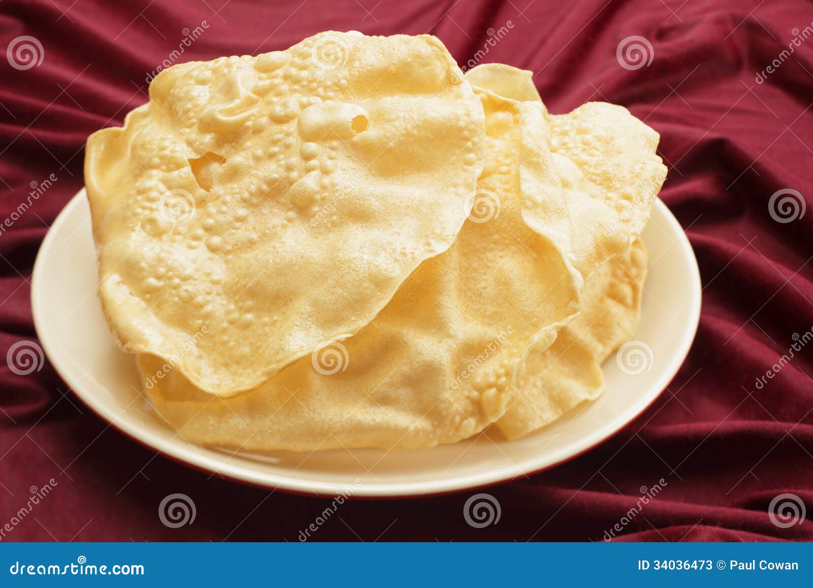 Poppadoms on a plate stock image. Image of appadum, indian - 34036473