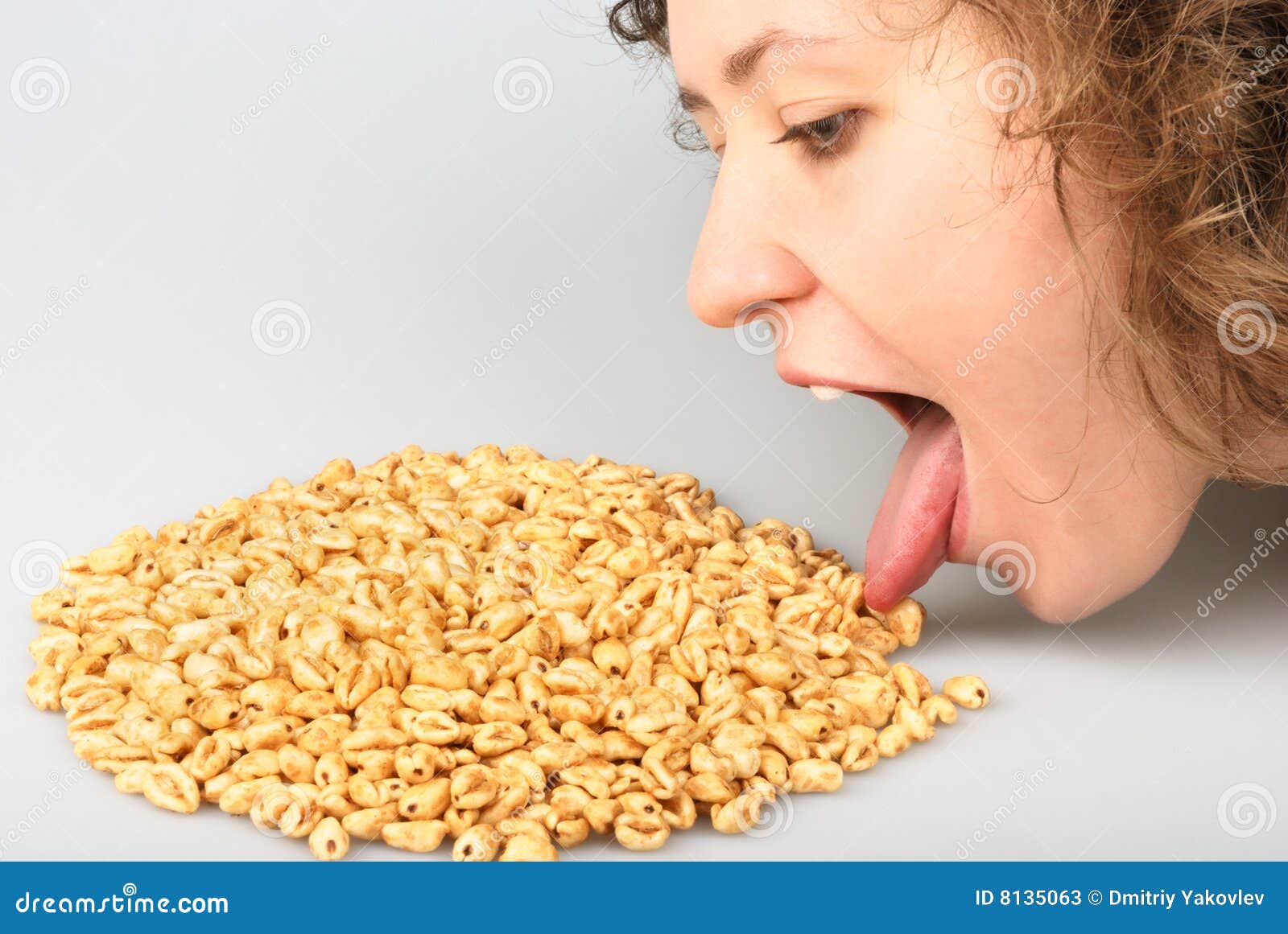 Popped Wheat Grains and Girl Stock Image - Image of evenly, mouth: 8135063