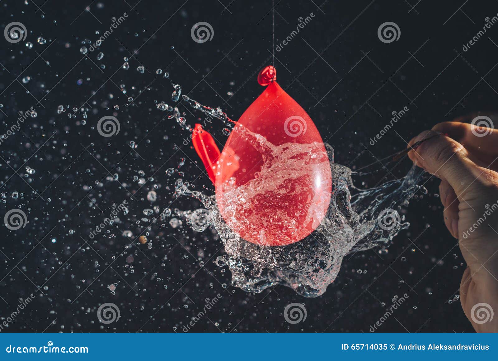 Popping water balloon stock image. Image of clear, energy - 65714035