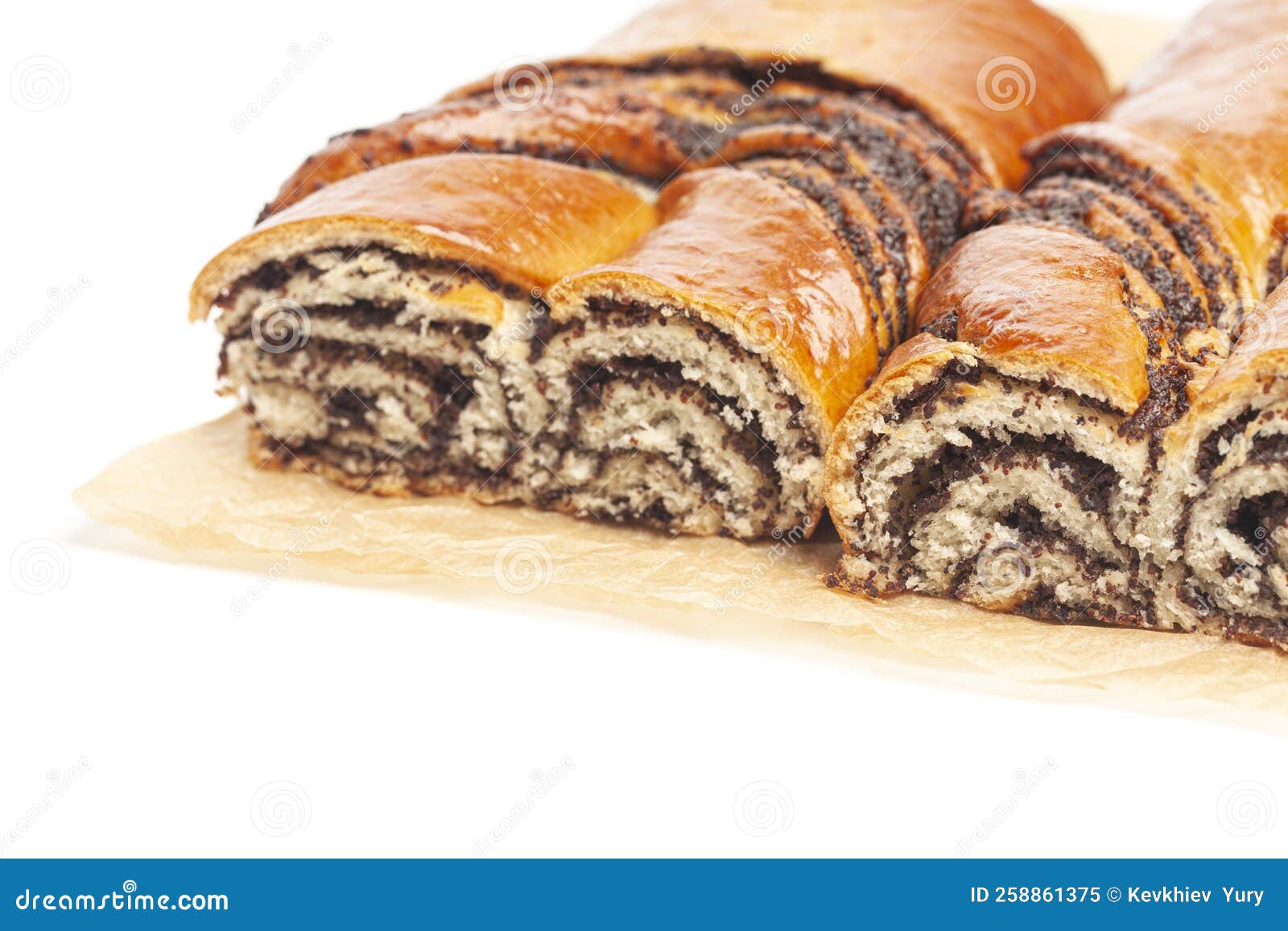 Poppy Seed Strudel on a Brown Baking Paper Isolated on White Stock ...