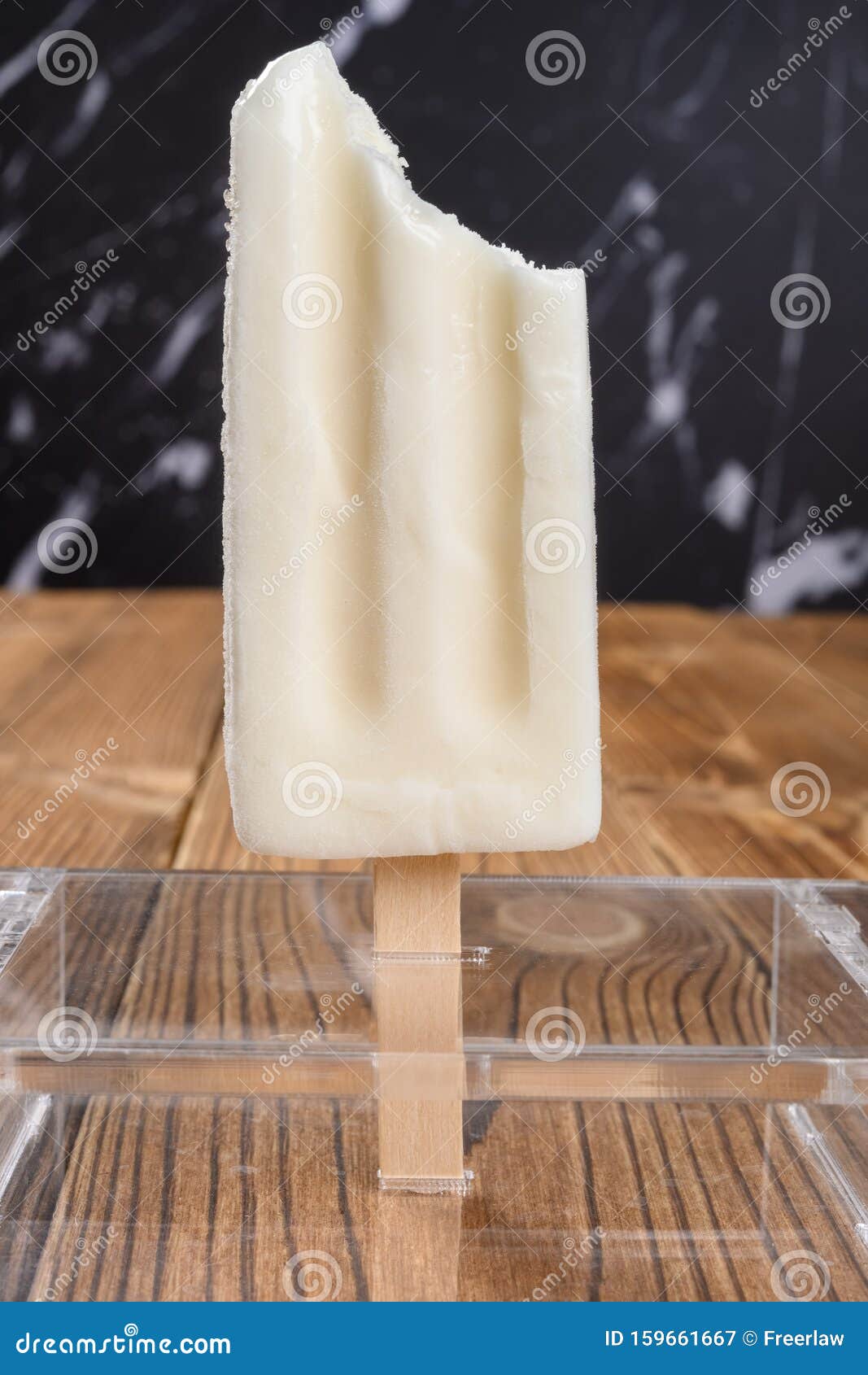Popsicle with big bite stock image. Image of food, freeze - 159661667