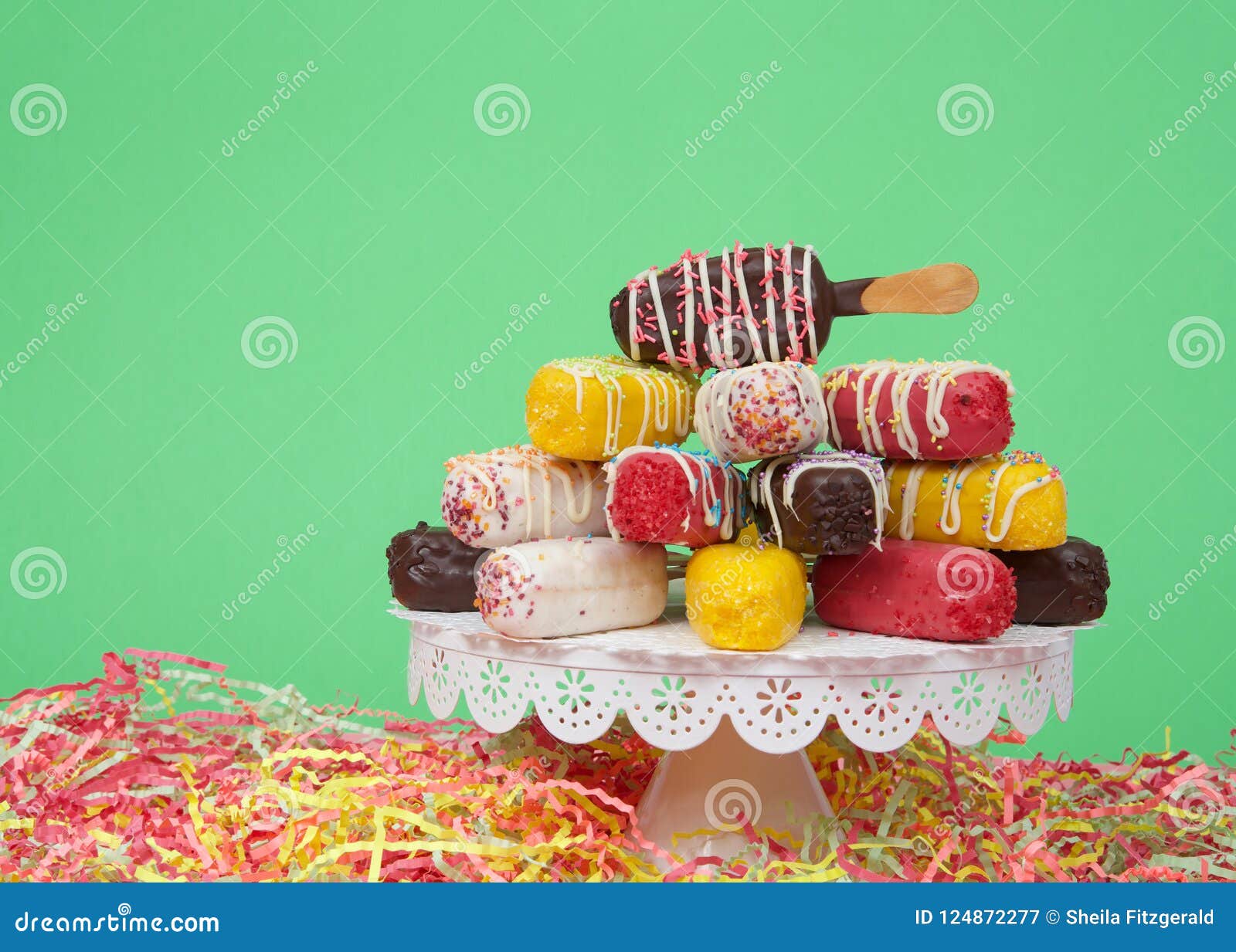 Popsicle Cake Pops On A Pedestal With Confetti Under Green Background Stock Image Image Of