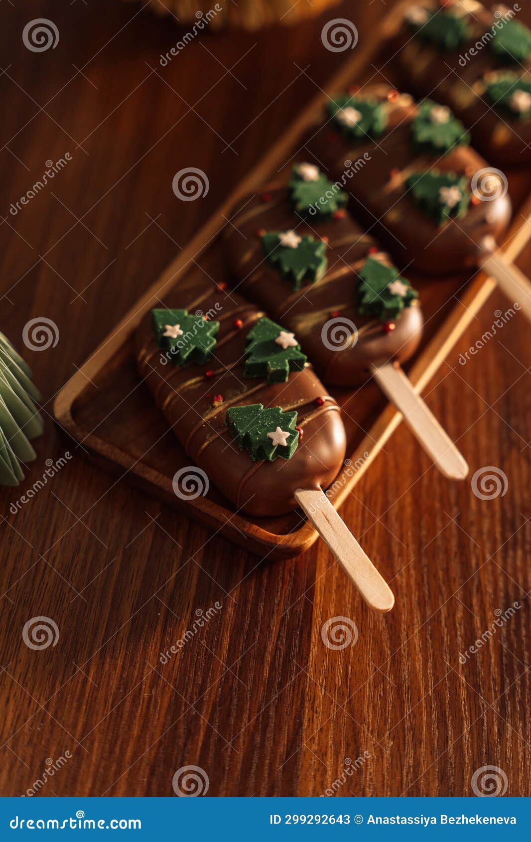 Popsicle-shaped Cake on a Stick in Chocolate with Small Chocolate Trees ...