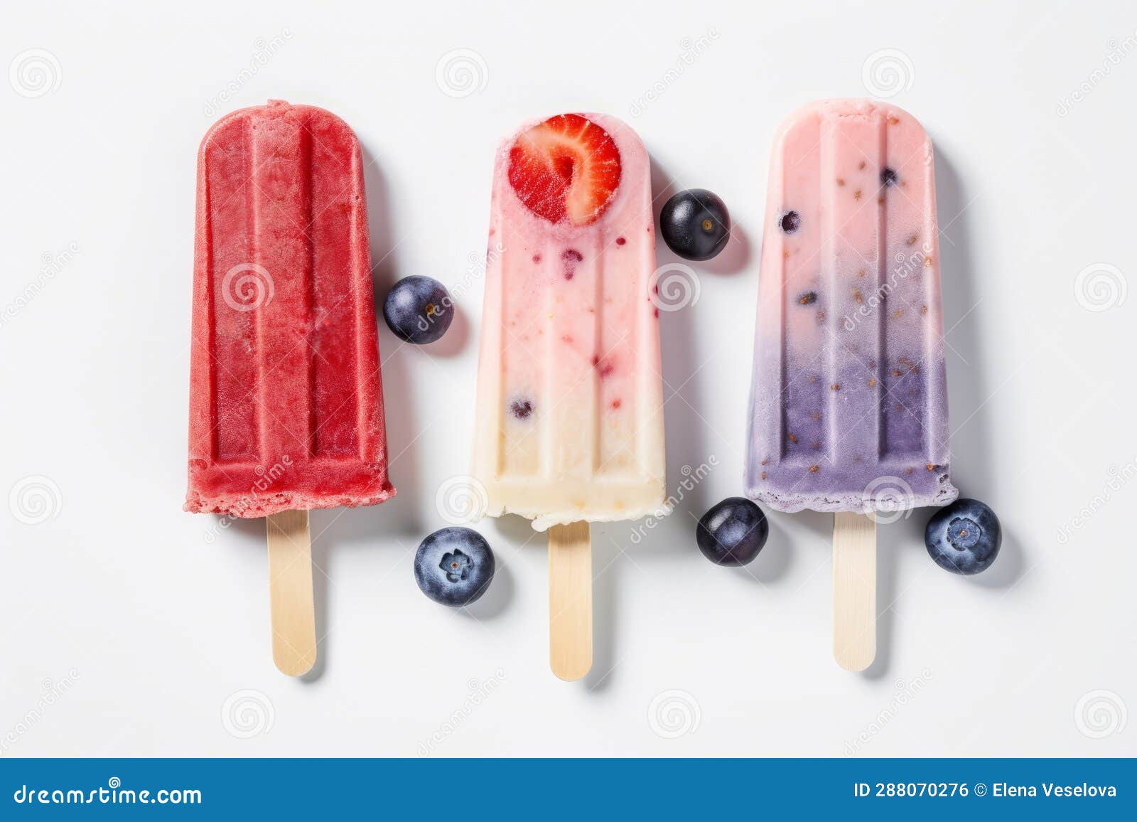 Variety of Berry Flavors of Popsicles Overhead View on White Background ...