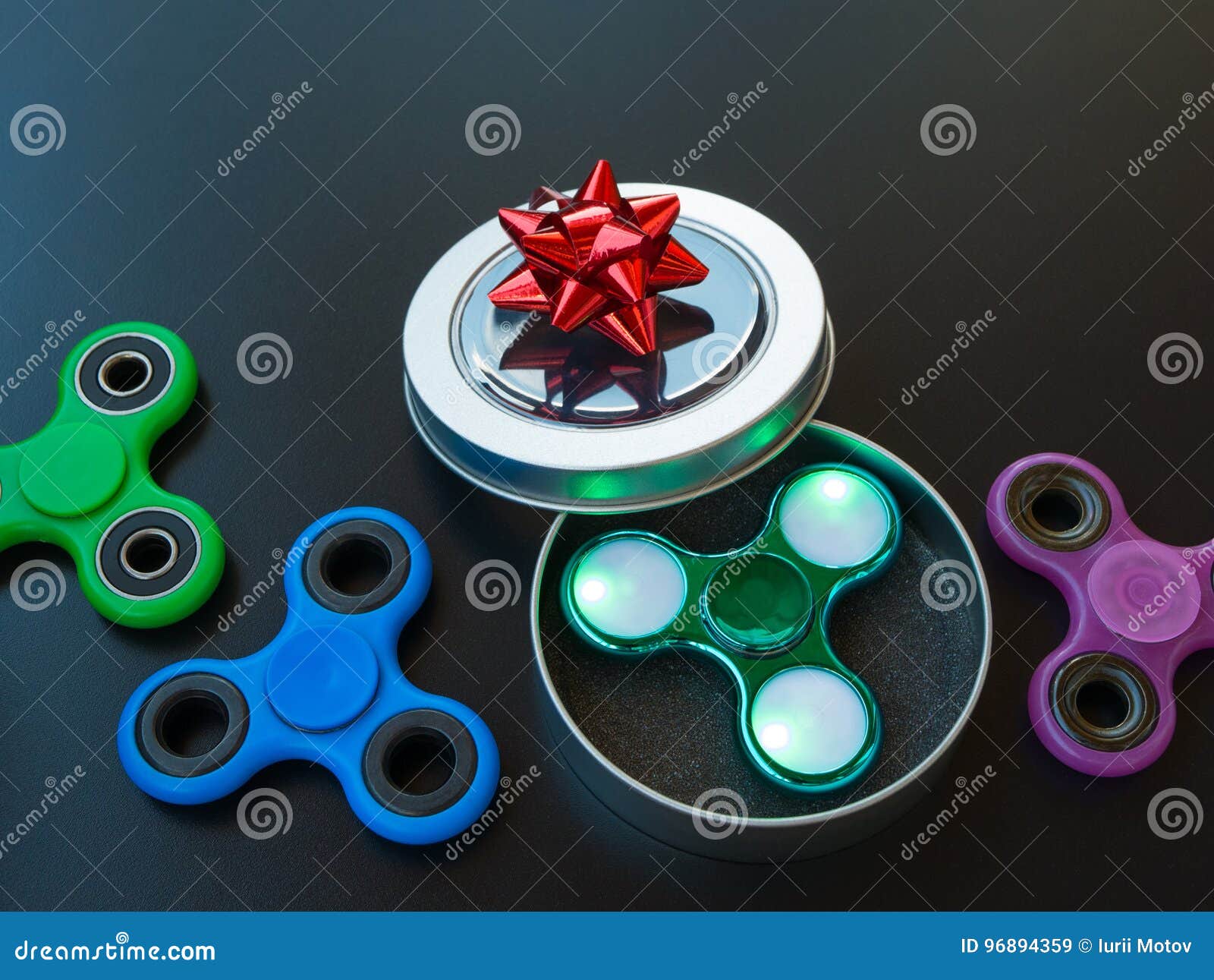 Popular Colourful Fidget Spinner Toy in a Gift Box on a Black ...
