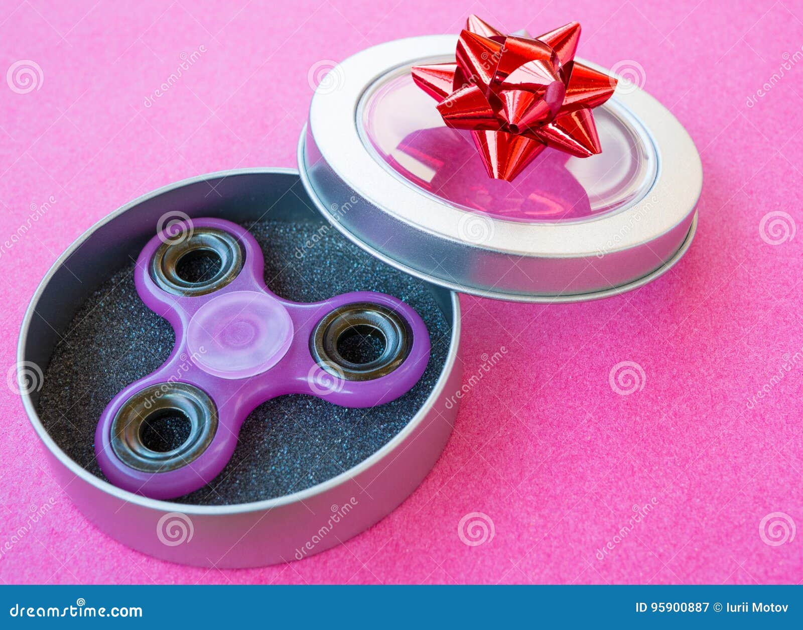 Popular Colourful Fidget Spinner Toy in a Gift Box on a Colored ...