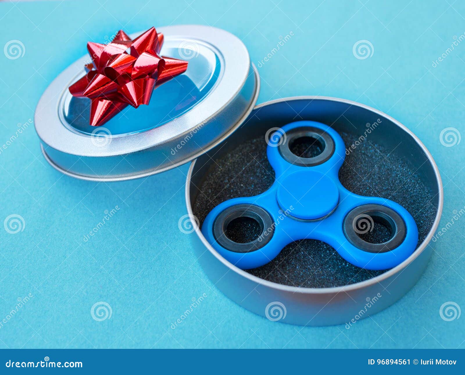 Popular Colourful Fidget Spinner Toy in a Gift Box on a Colored ...