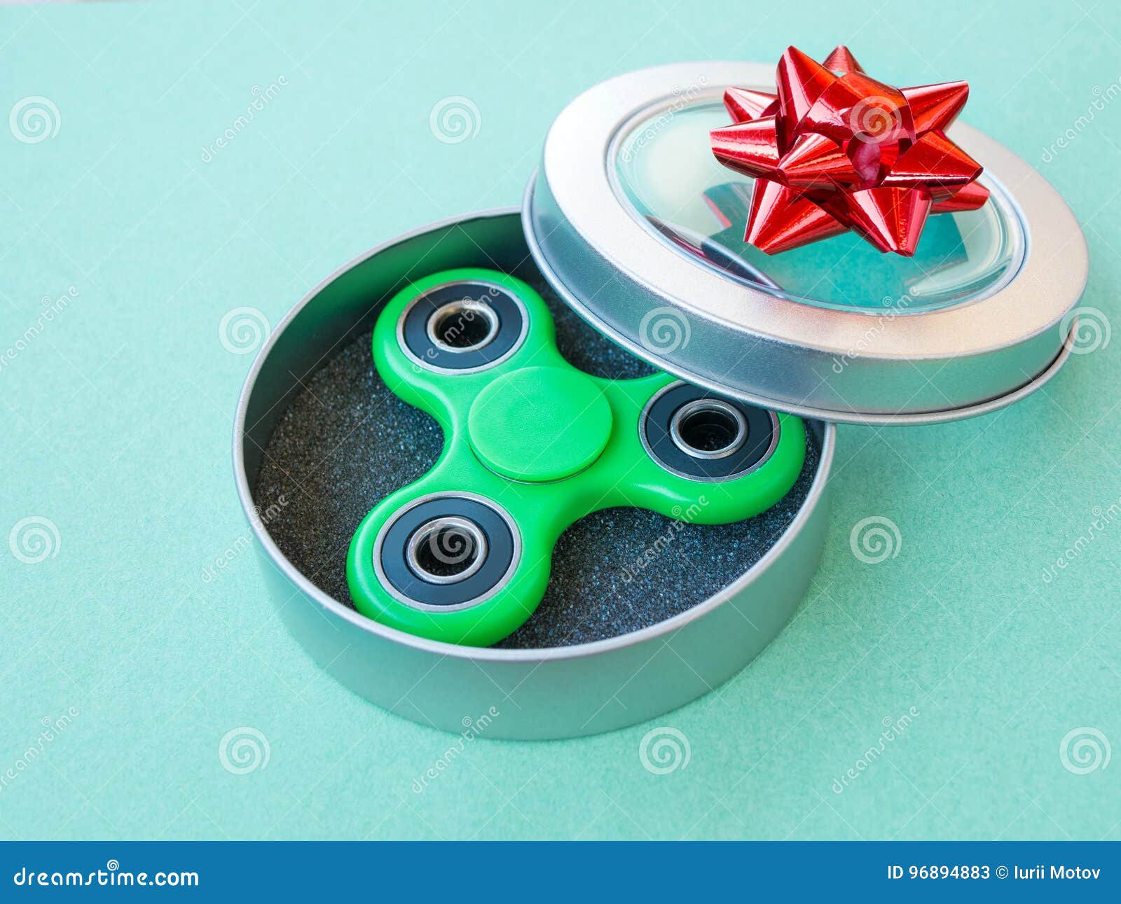 Popular Colourful Fidget Spinner Toy in a Gift Box on a Colored ...