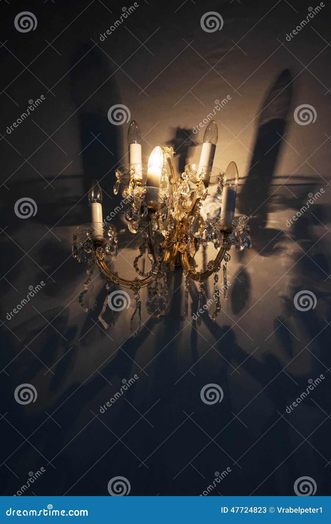 Porcelain Chandelier on the Wall and Magic Shadow Stock Image - Image ...
