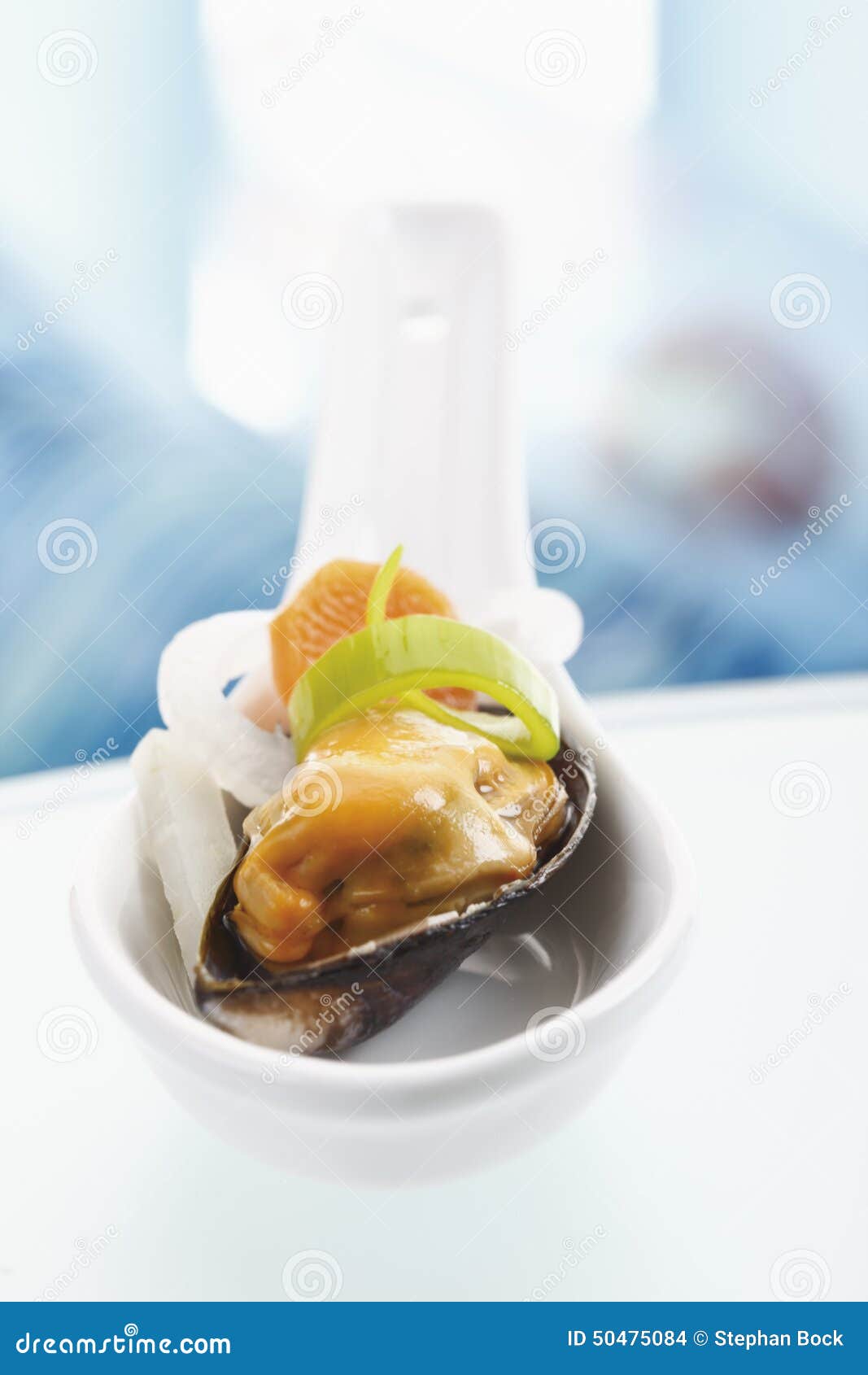 Porcelain Spoon with Mussel and Mixed Vegetables Stock Photo - Image of ...