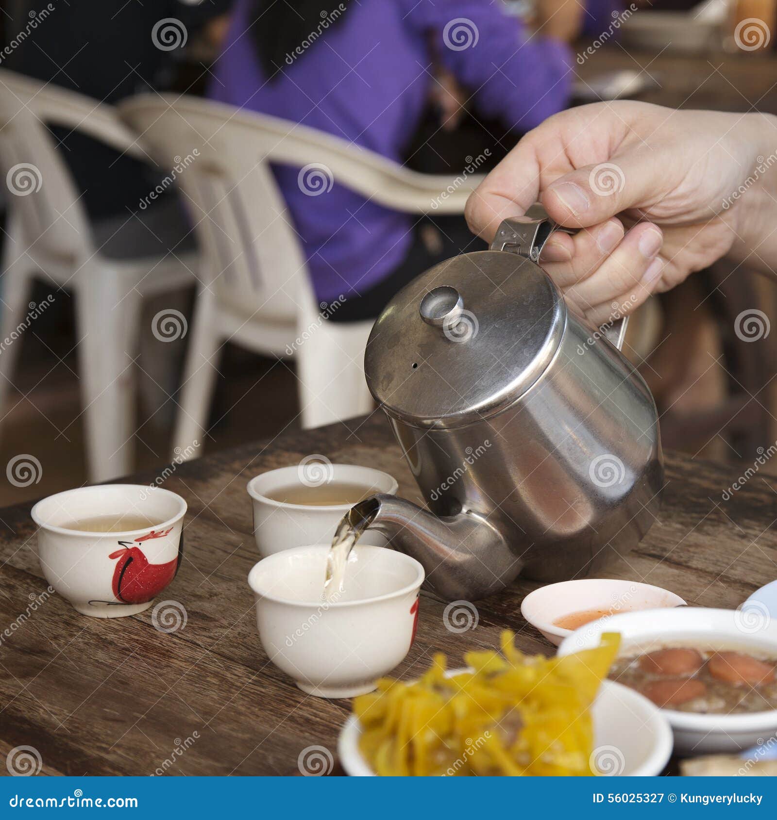Poring Tea stock image. Image of saucer, teapot, background - 56025327