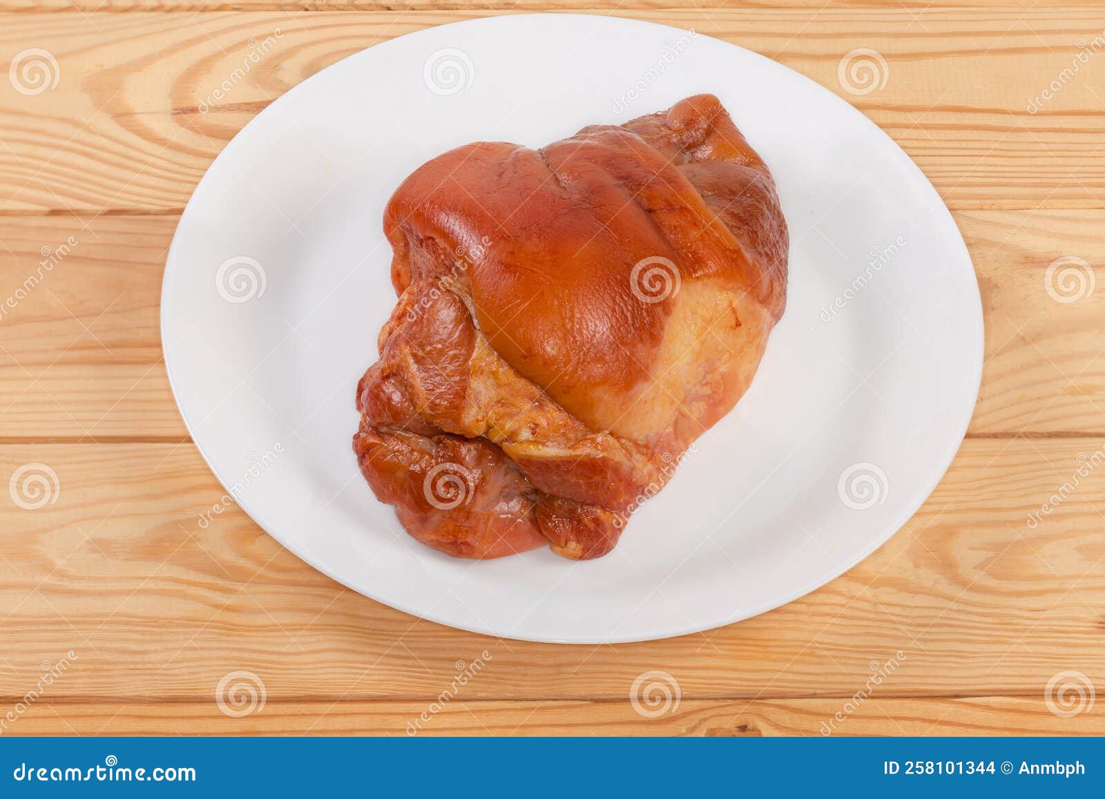 Boiled-smoked Pork Knuckle on the Dish on Rustic Table Stock Photo ...