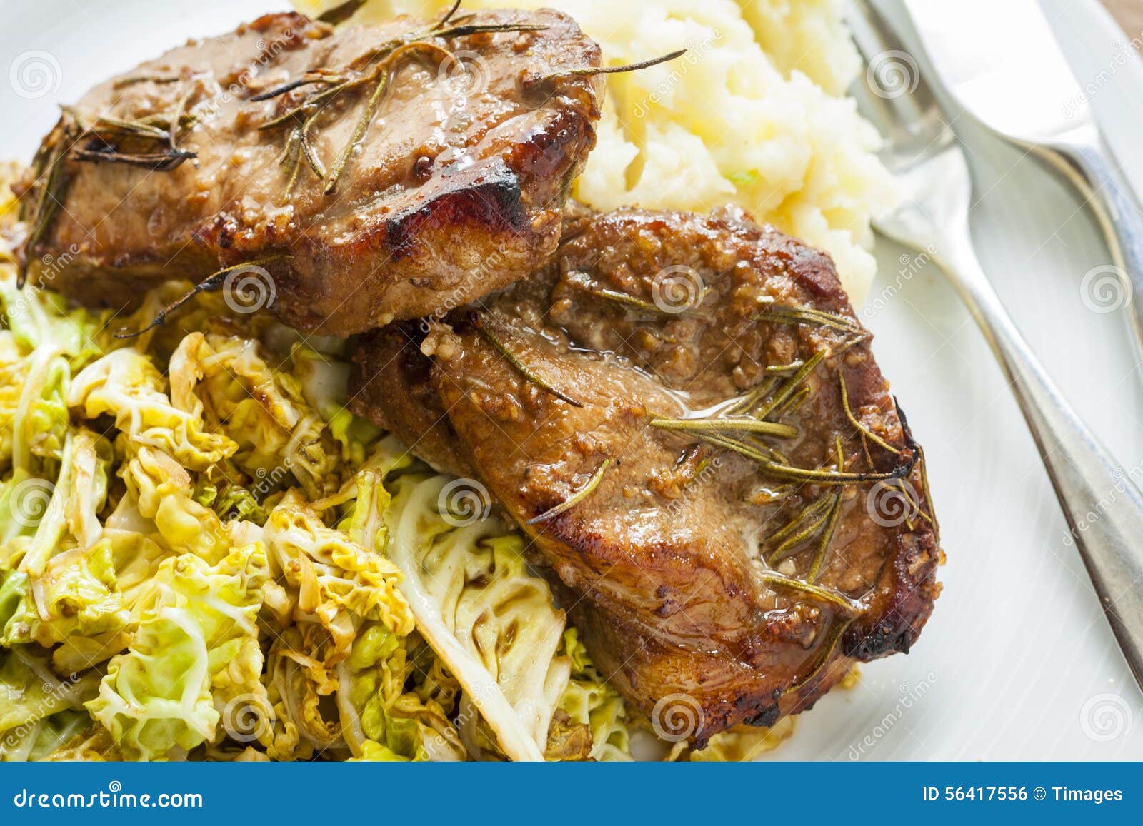 Pork chops on cabbage stock photo. Image of vegetables - 56417556