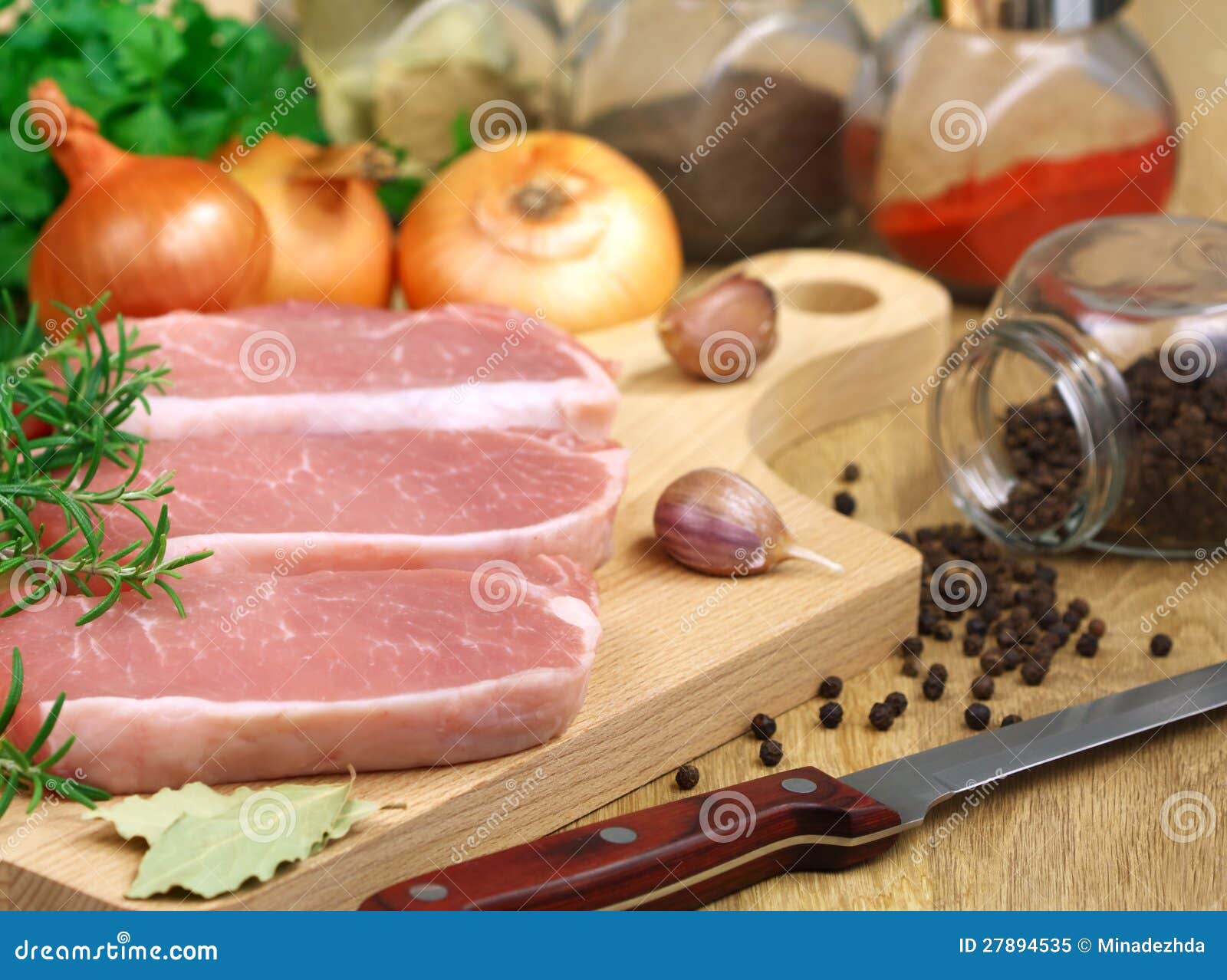 Pork on a cutting board stock image. Image of cooking - 27894535
