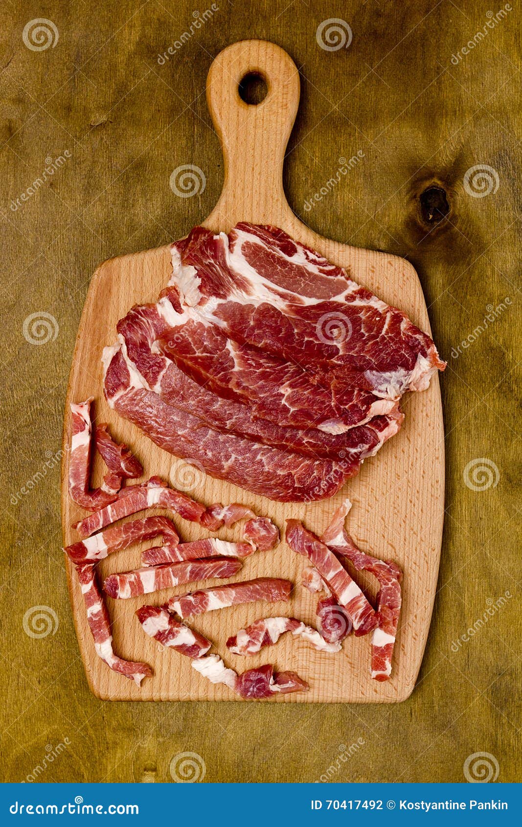 Pork on a cutting board stock photo. Image of steaks - 70417492