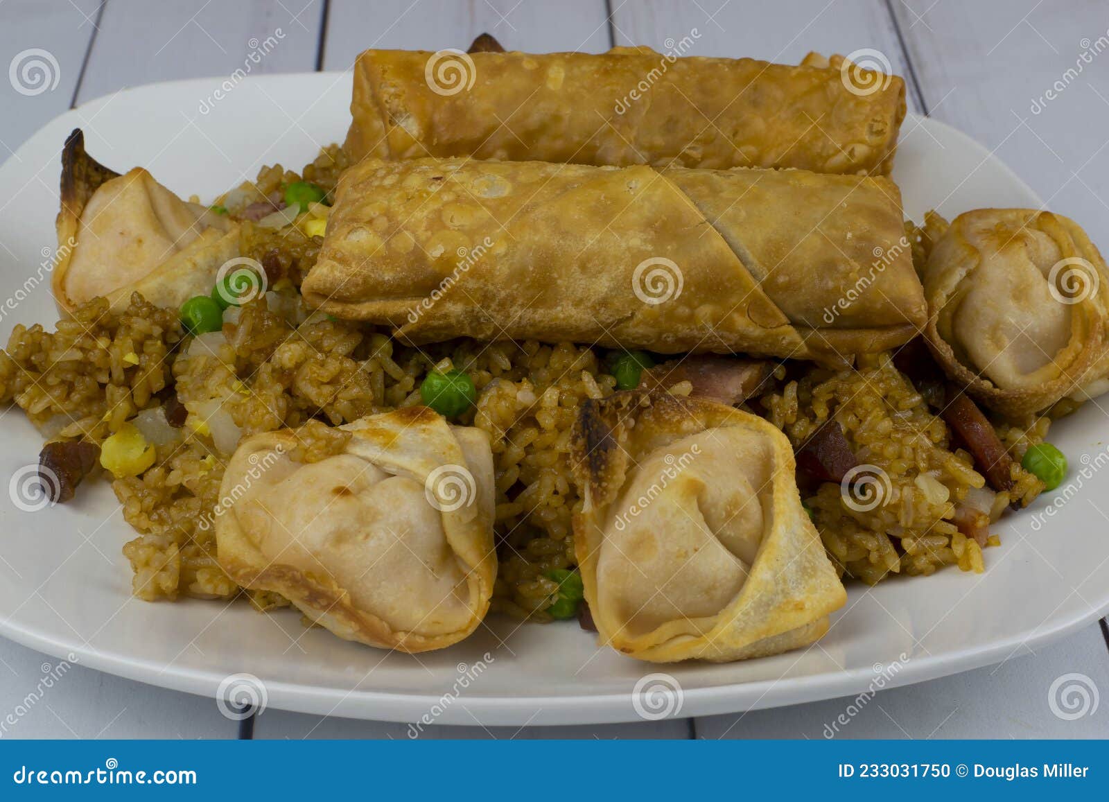 Lobster Rangoon with Pork Fried Rice and Egg Rolls Stock Photo - Image ...