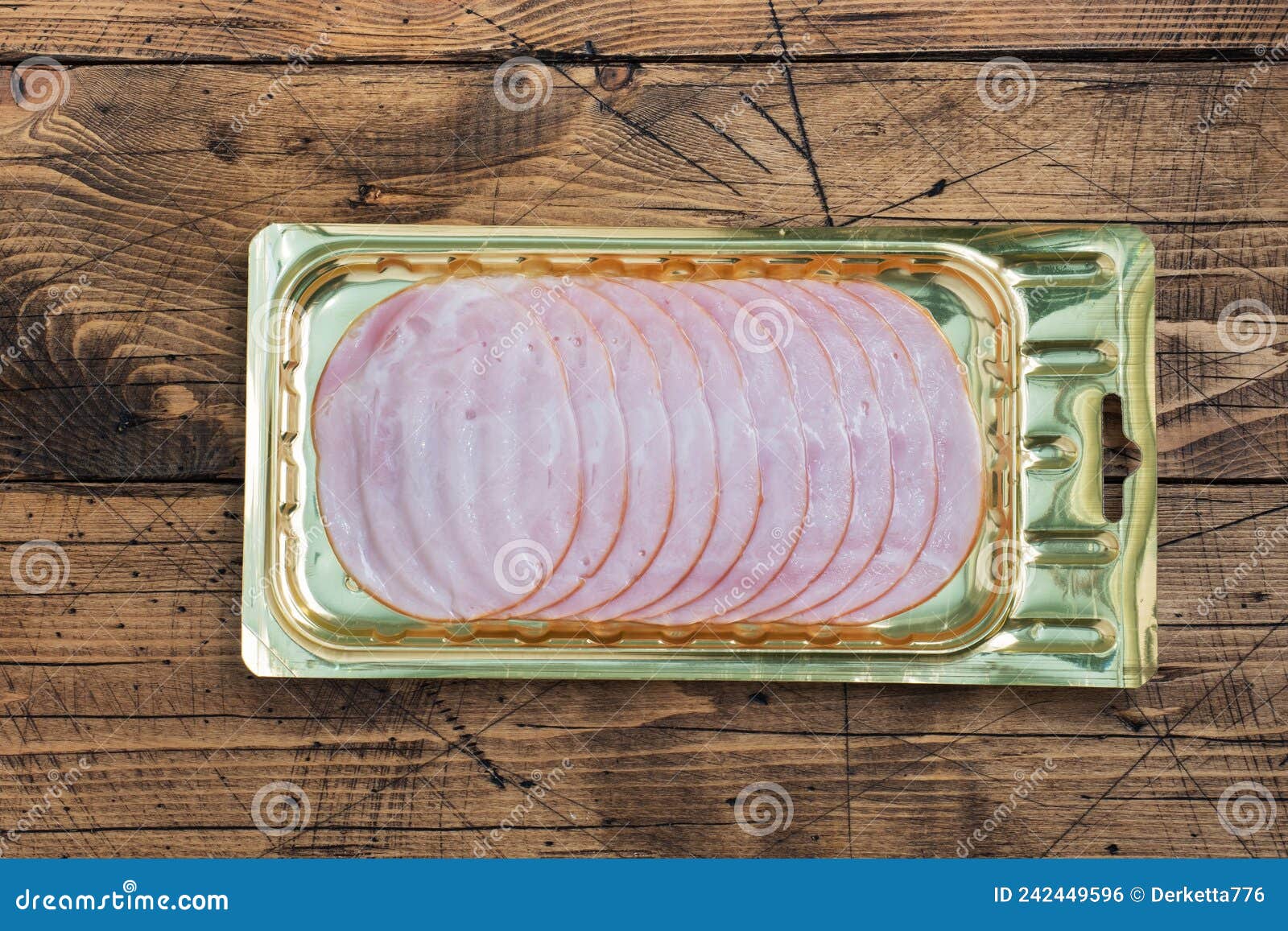 Pork Ham in Thin Slices in a Vacuum Package on the Table. Meat Sliced ...