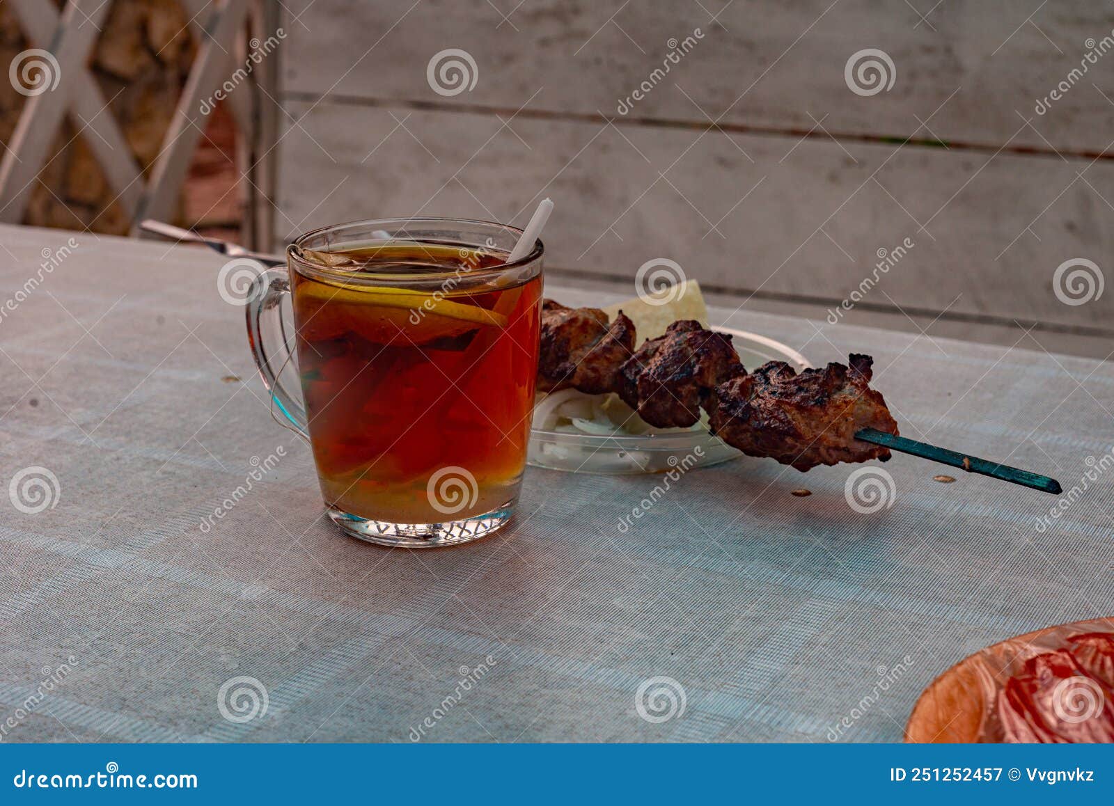 Pork Kebab and a Cup of Black Tea on the Table Stock Image - Image of ...