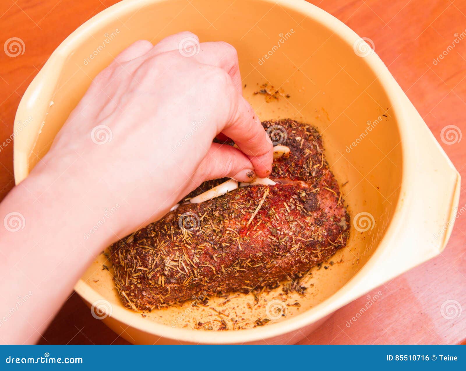 Pork loin being seasoned stock photo. Image of fried - 85510716