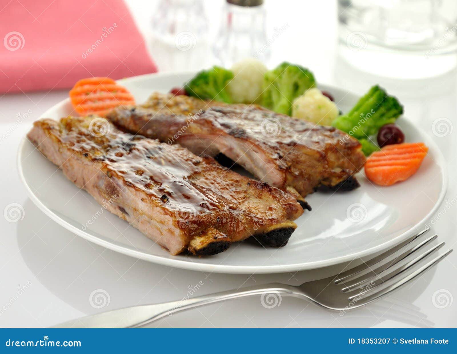 Pork ribs dinner stock image. Image of meat, flames, grilling - 18353207