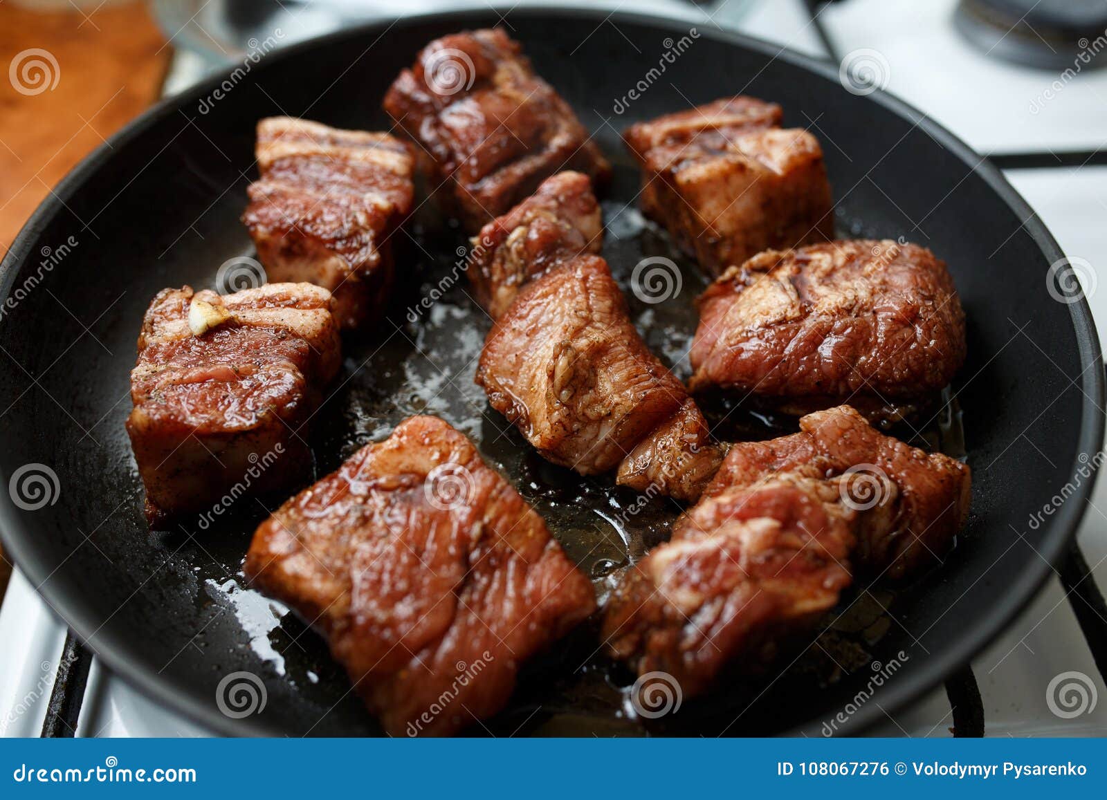 Pork ribs fried in a pan. stock photo. Image of frying - 108067276