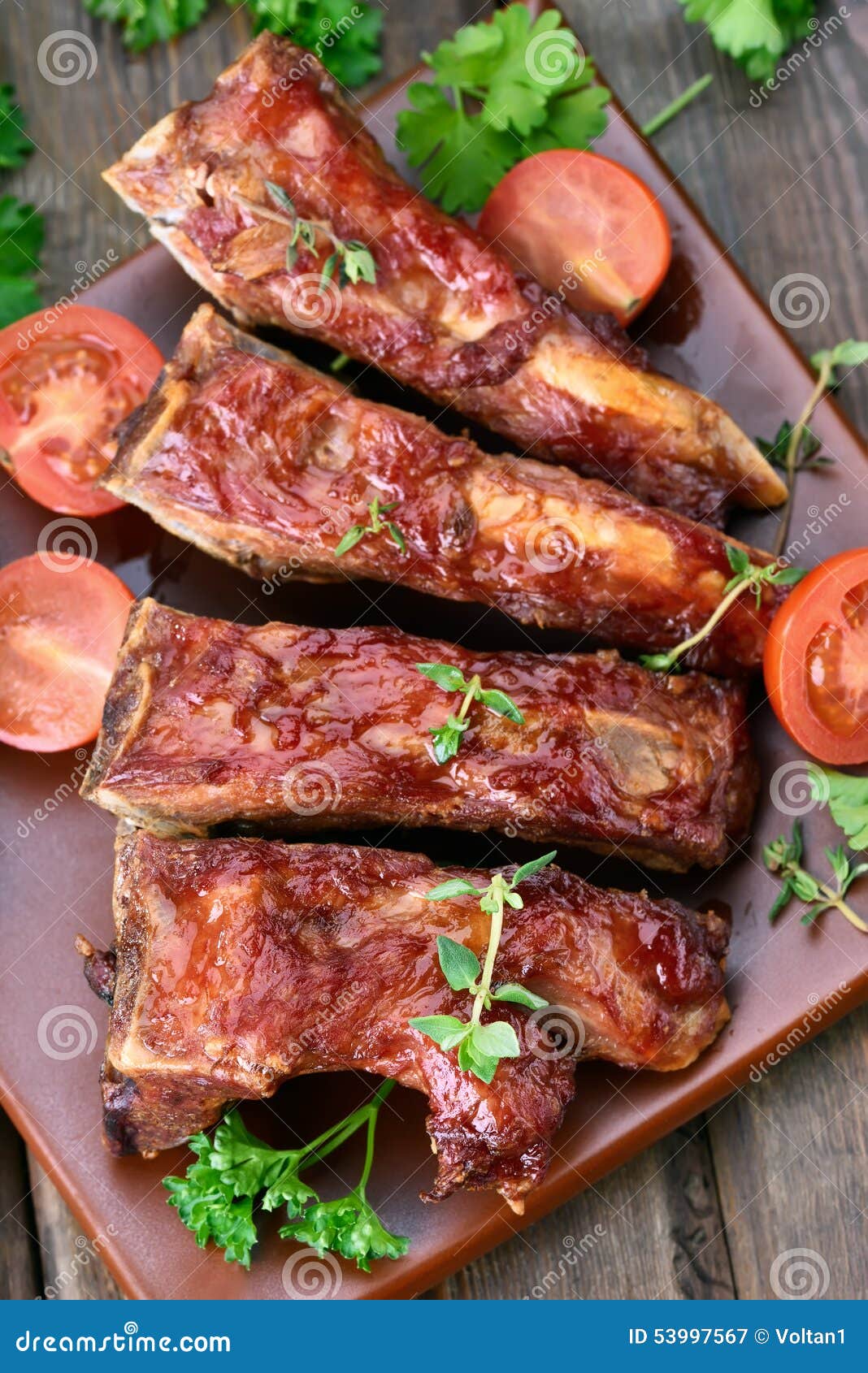 Pork ribs on plate stock image. Image of meal, grilled - 53997567