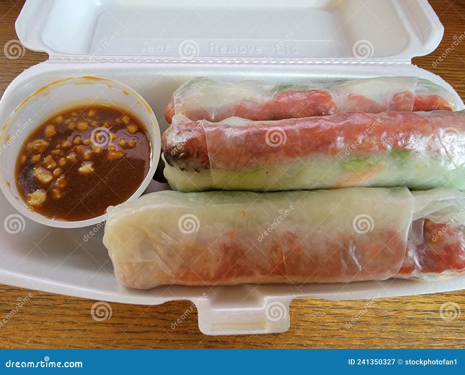 Pork and Rice Paper Vietnamese Rolls in Container with Sauce Stock ...