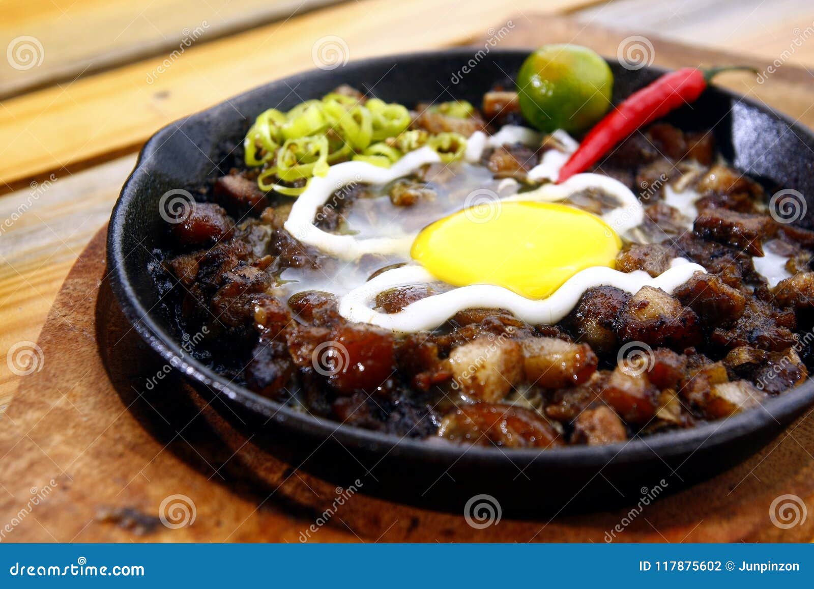 Pork Sisig on a Sizzling Plate Stock Photo - Image of health, chopped ...