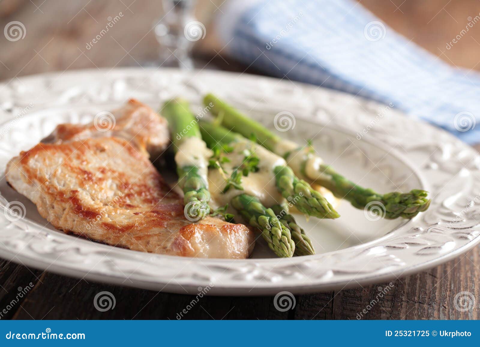 Pork steak with asparagus stock image. Image of lunch - 25321725