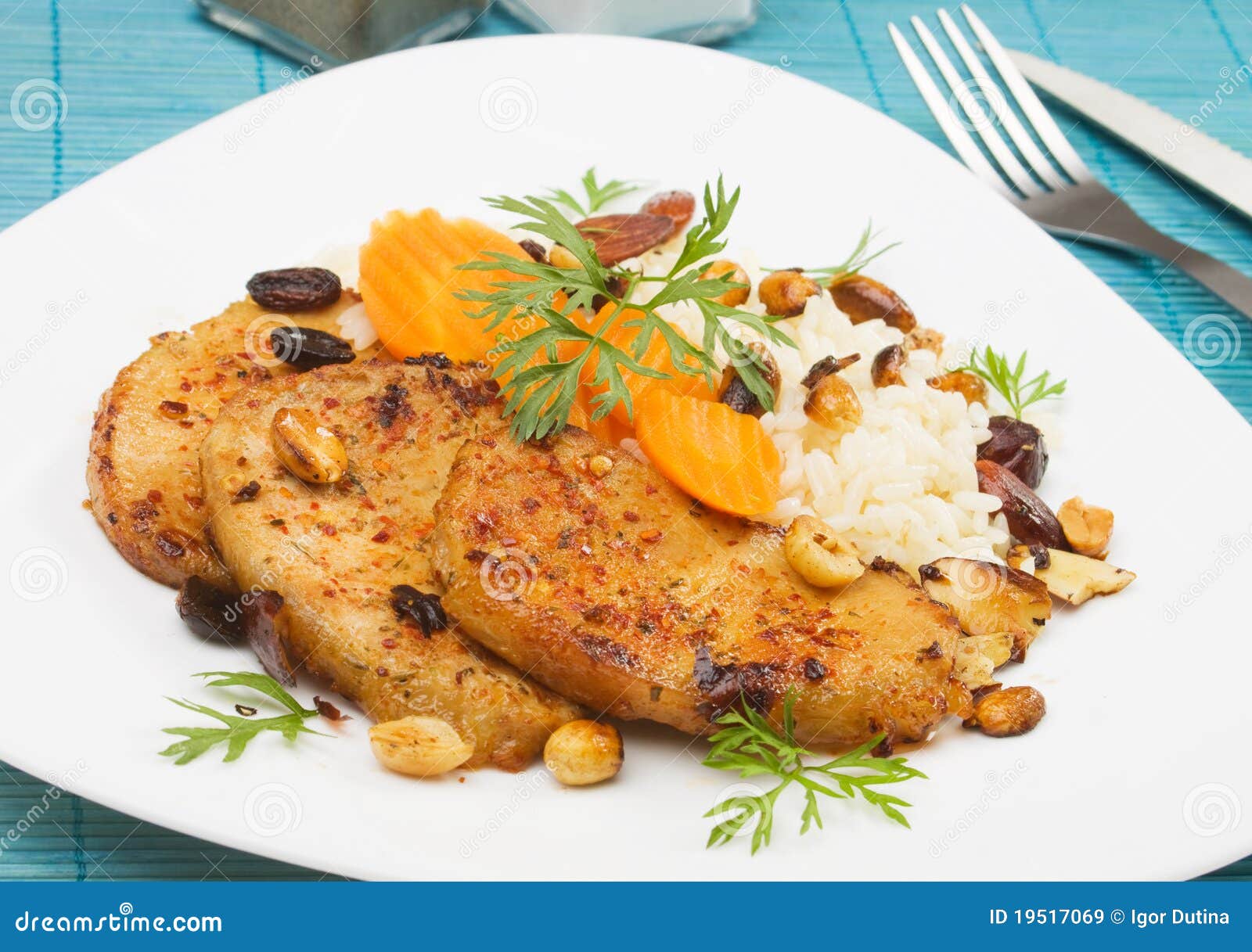 Pork Steak with Roasted Nuts and Rice Stock Image - Image of peanut ...