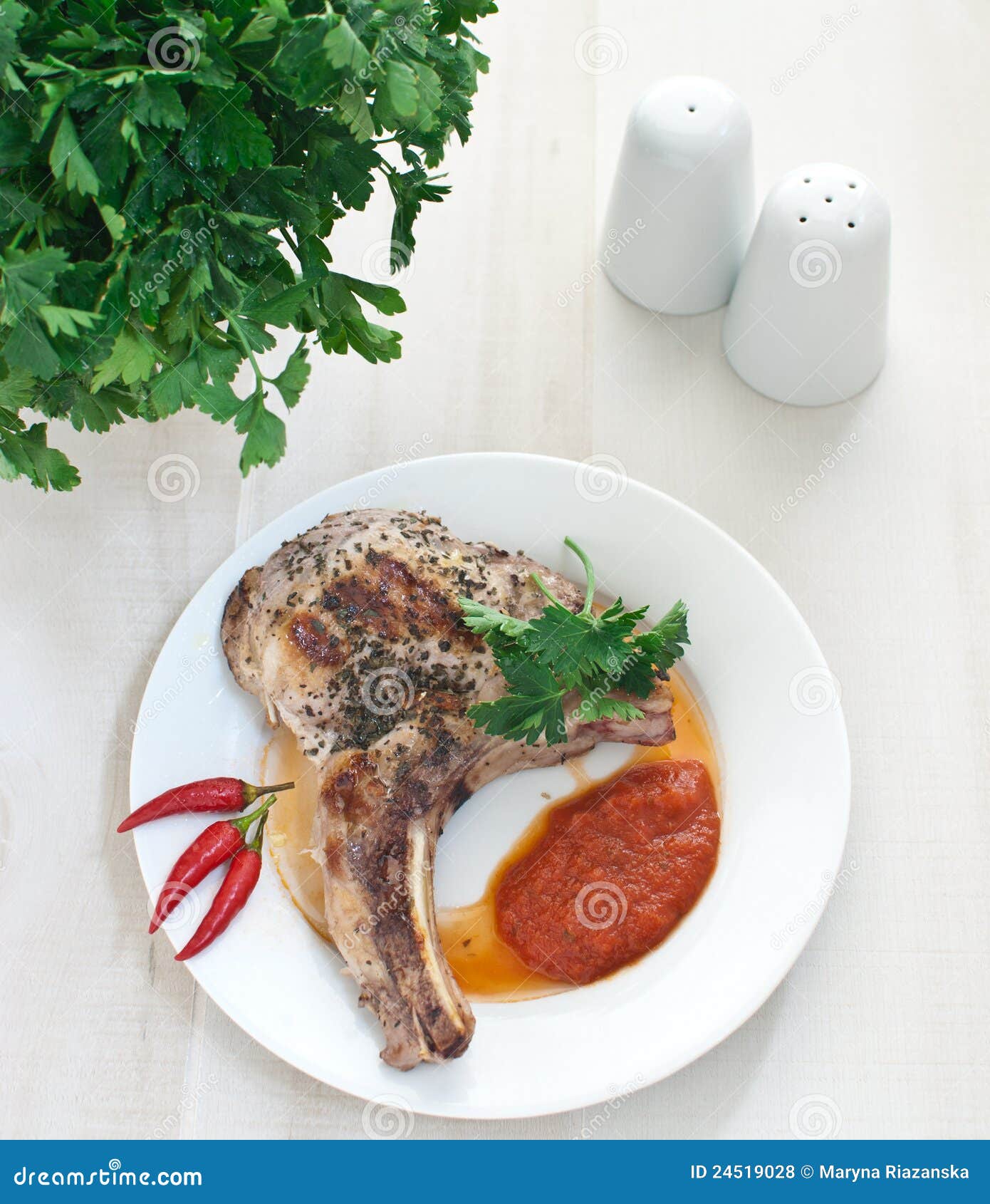 Pork steak vertical stock photo. Image of flatware, herb - 24519028