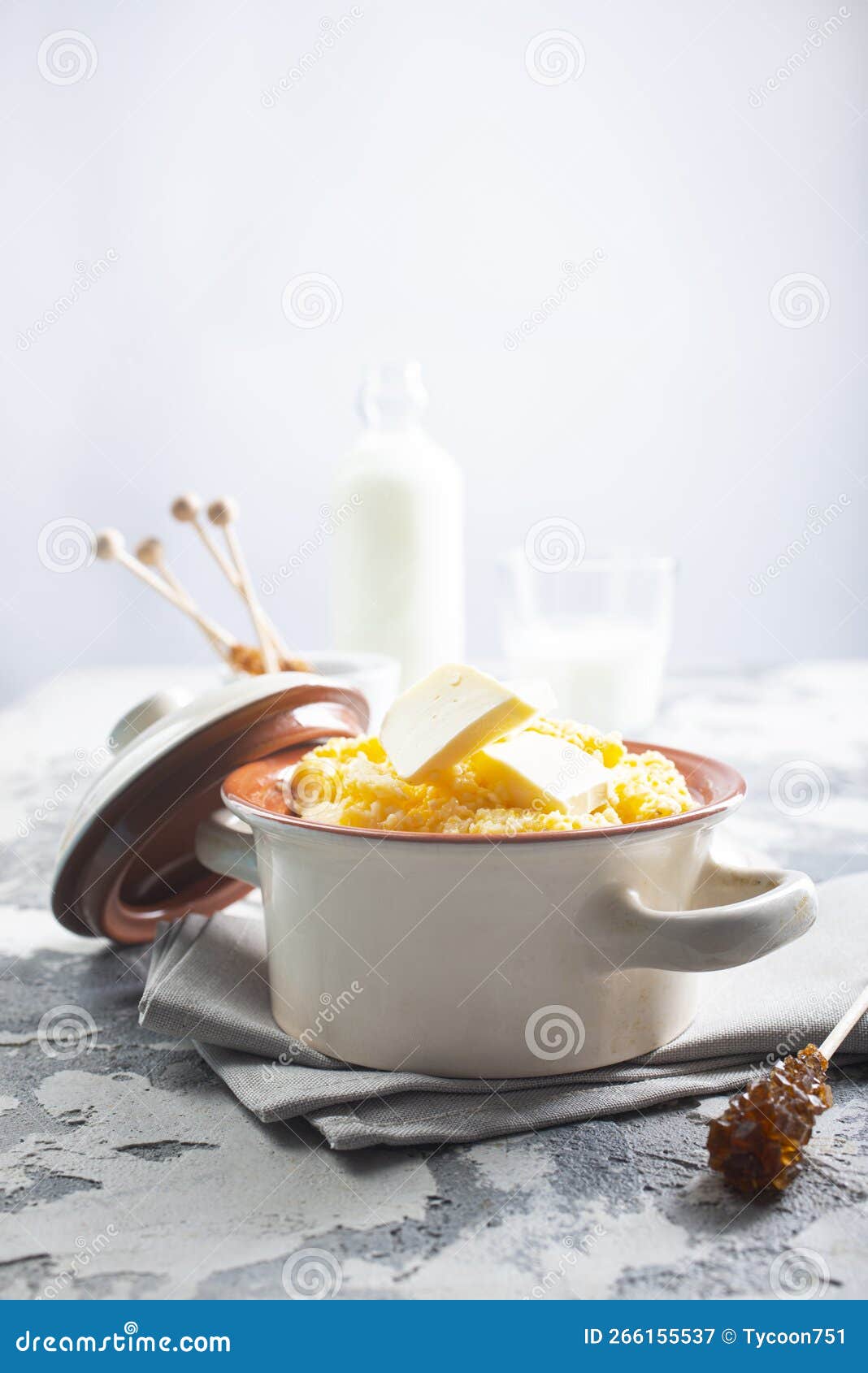 Porridge with Butter in Plate on Rustic Table Stock Image - Image of ...