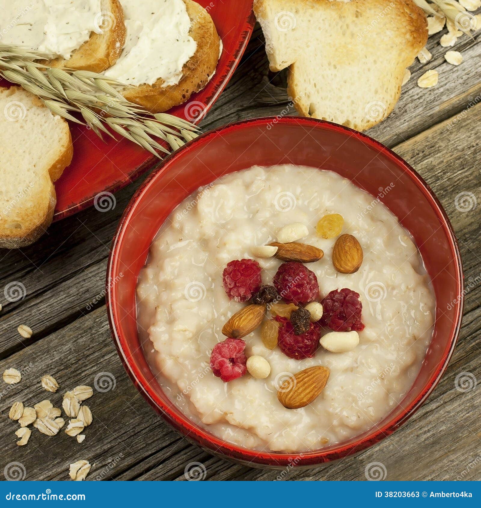 Porridge with Fresh Raspberry and Almonds Nuts Stock Image - Image of ...