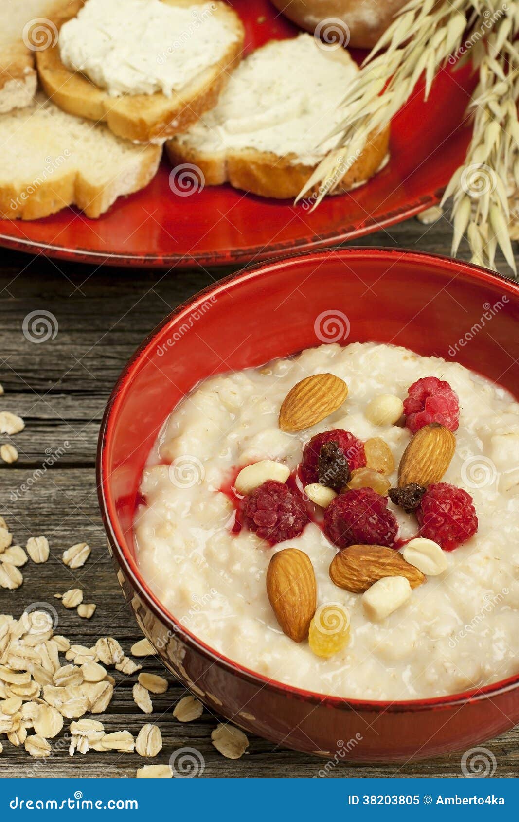 Porridge with Fresh Raspberry and Almonds Nuts Stock Image - Image of ...