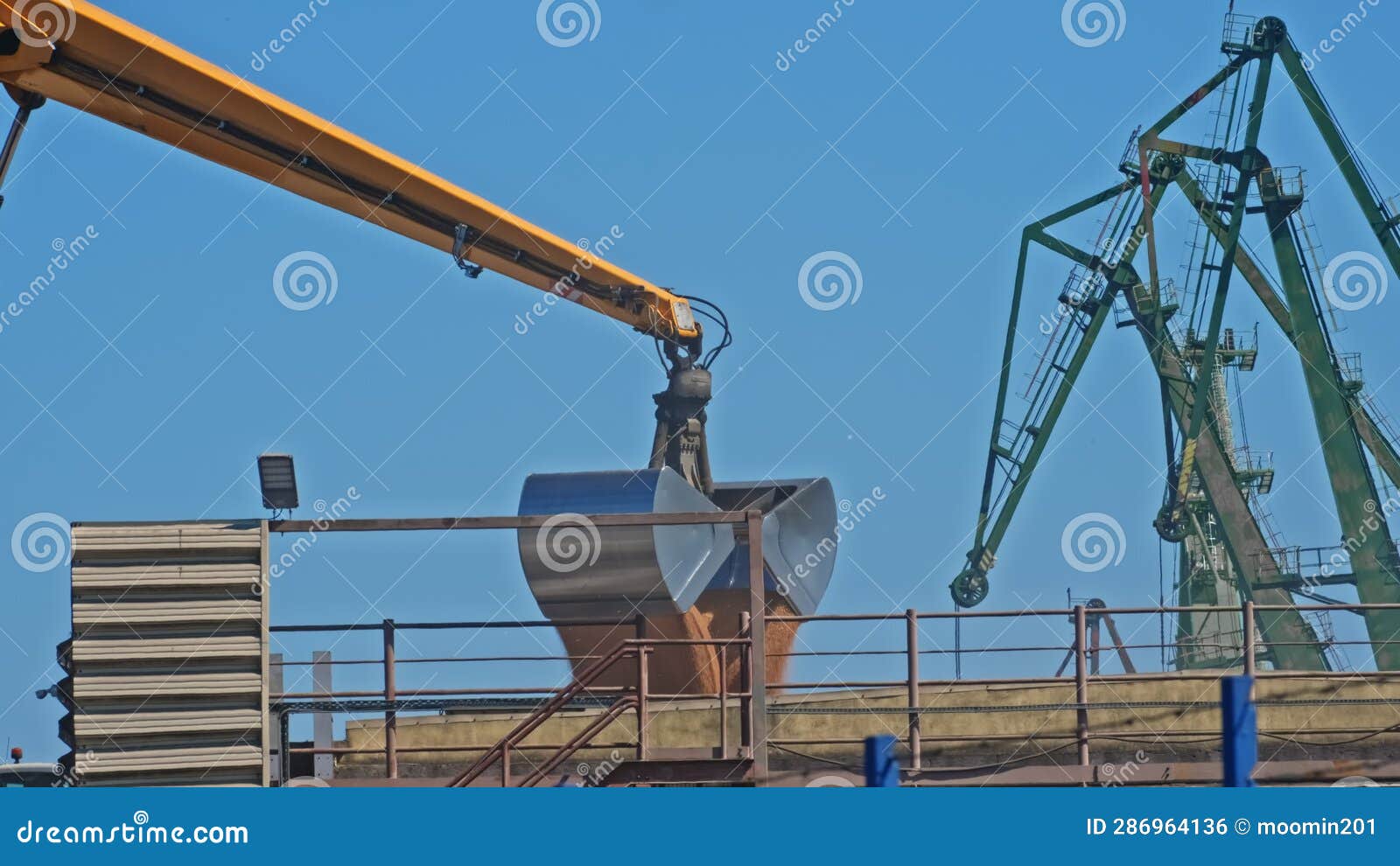 Port Crane with Scoop Loading Freight Ship with Wheat Grain Stock ...