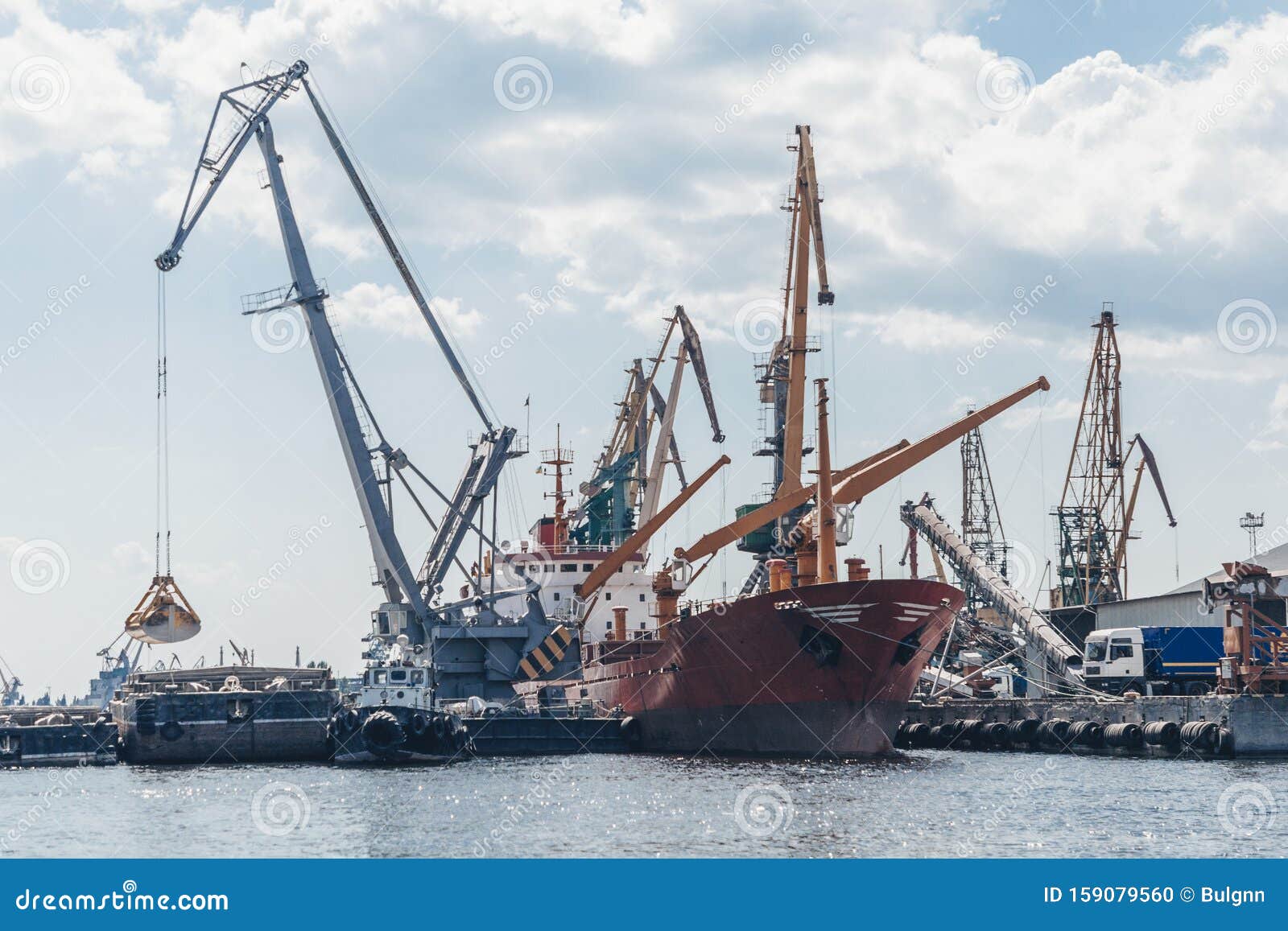 Port Cranes and Equipment for Loading and Unloading Cargo. the Concept ...