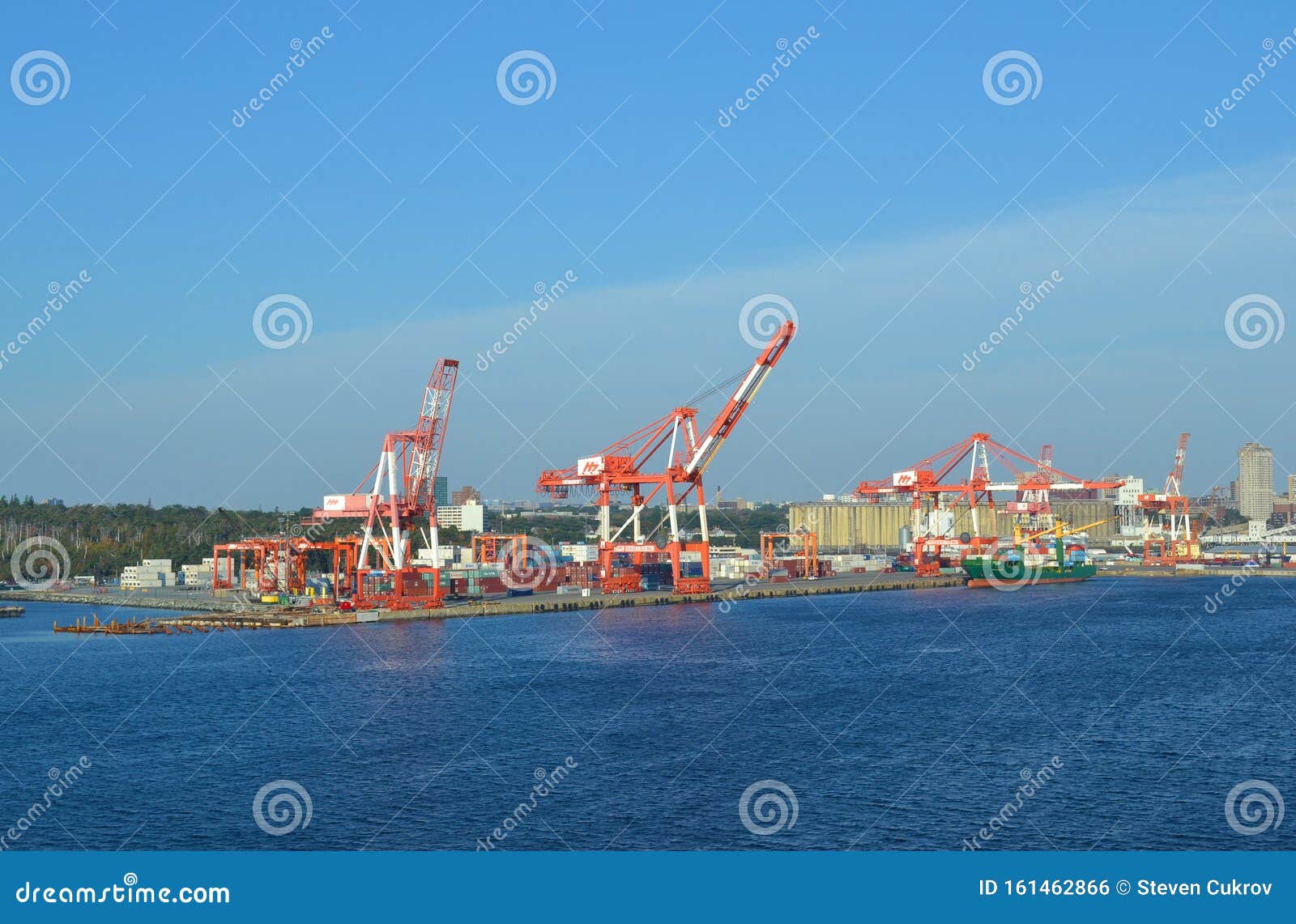 The Port of Halifax with Container Ships and Off-loading Cranes ...
