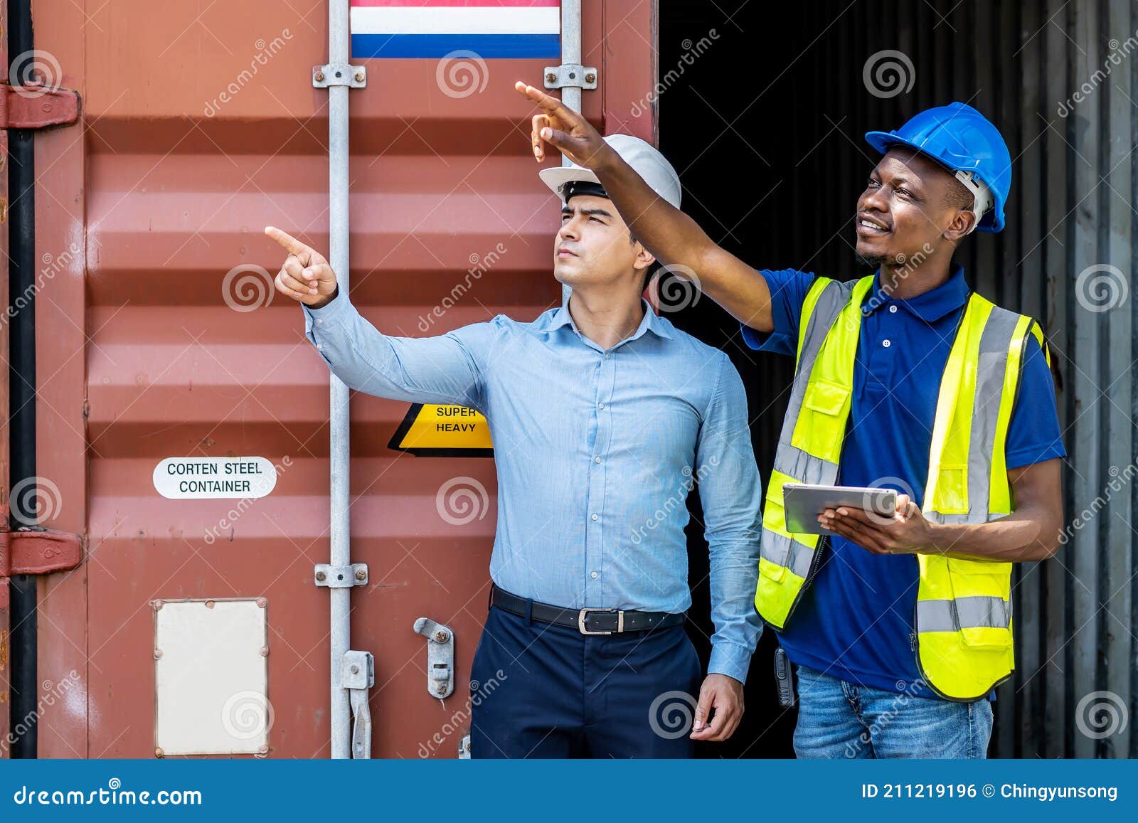 Port Manager and a Colleague Tracking Inventory while Standing Point To ...