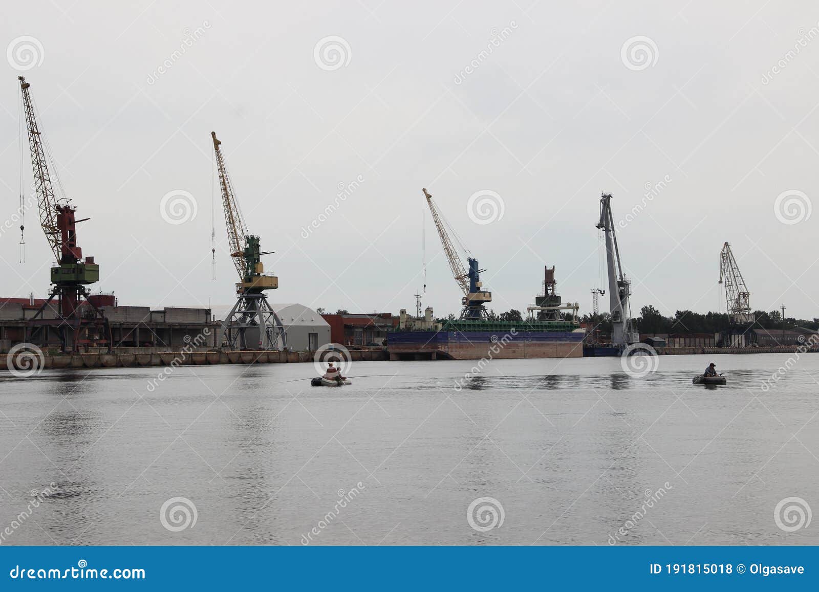 Port Terminal. Heavy Lifting Cranes Stand in a Row Stock Photo - Image ...