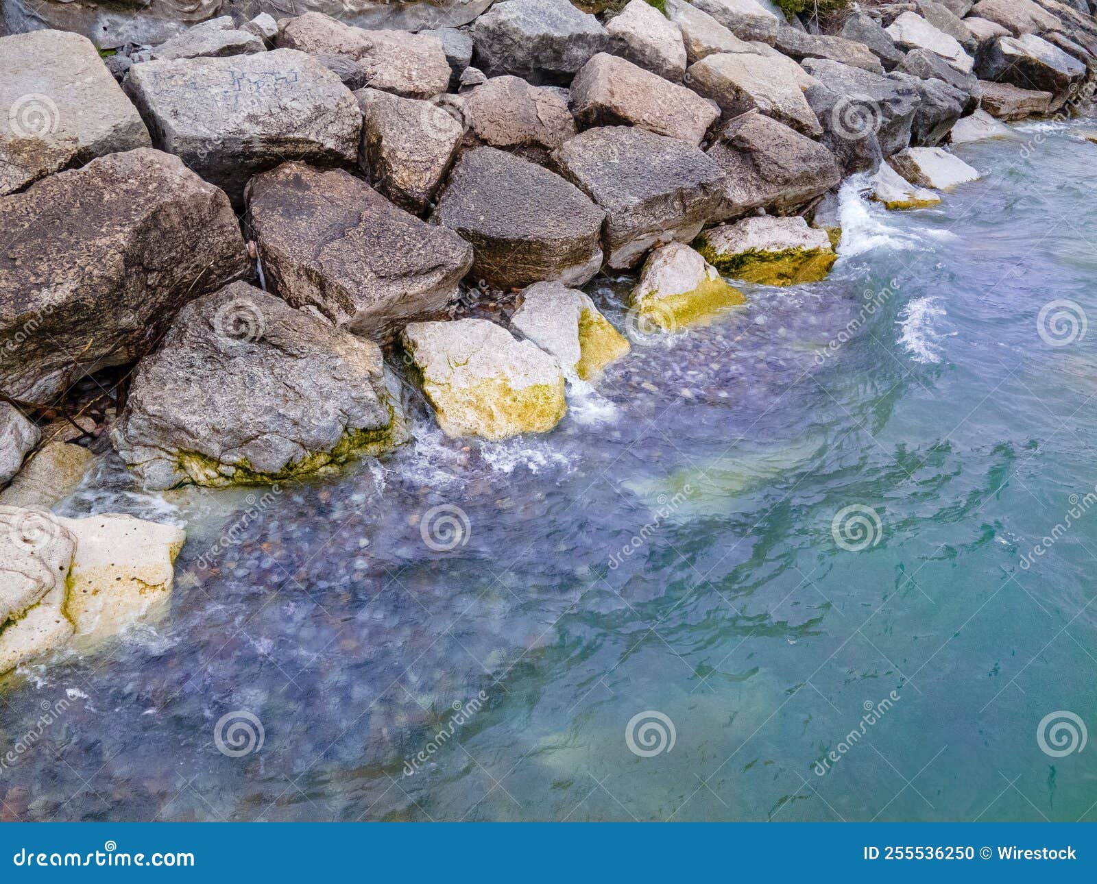 Port West Beach Break Wall on the Ocean Stock Photo - Image of glowing ...