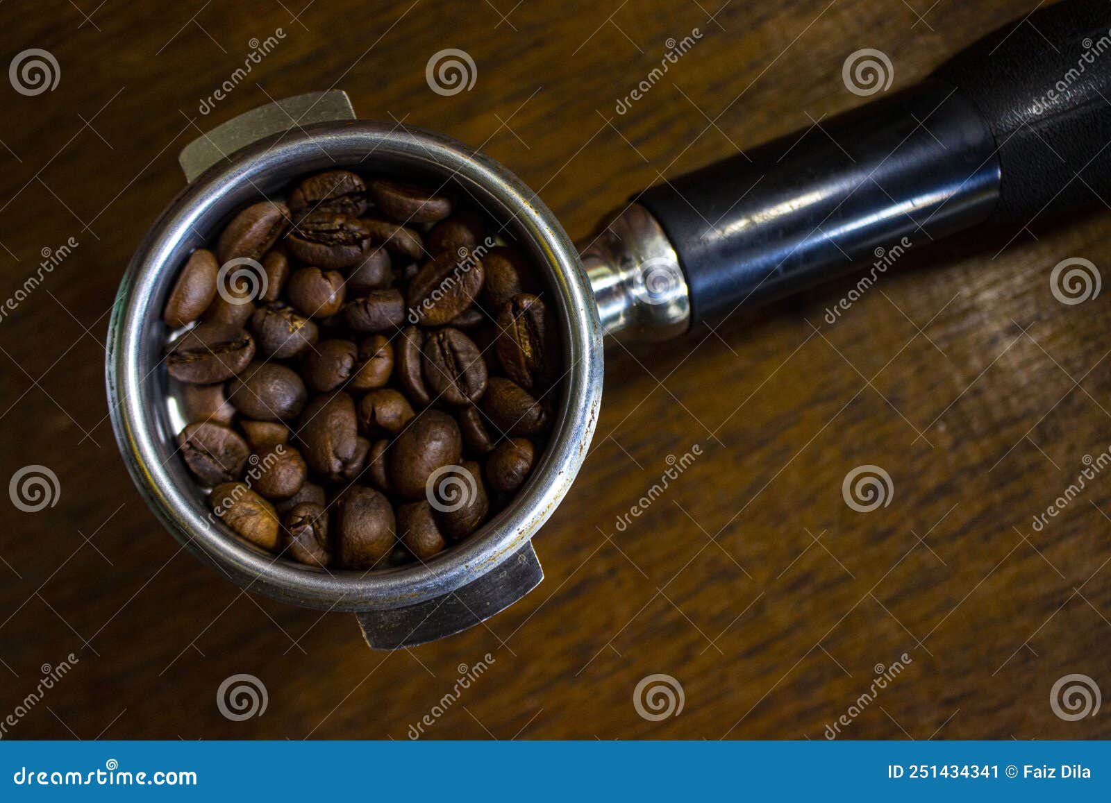 Porta Filter with Ground Coffee and Coffee Bean on Table. Stock Image ...