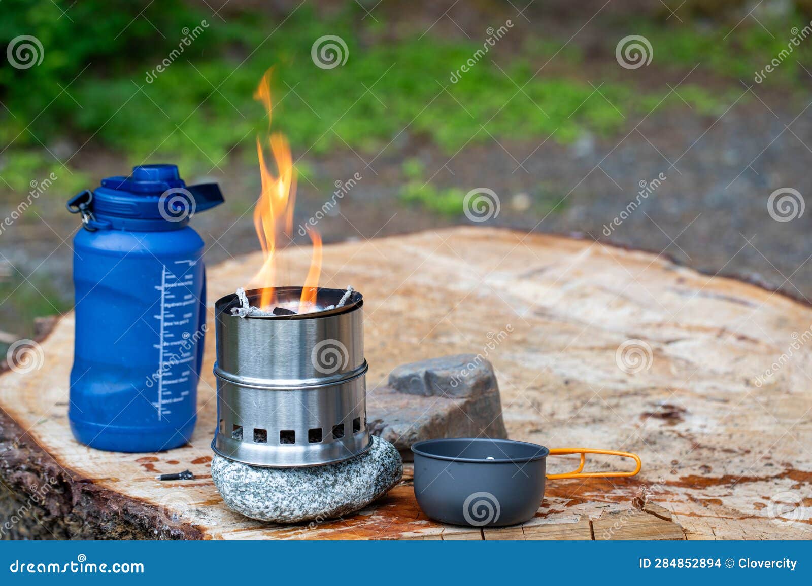 Portable Camp Stove Burning Sticks Stock Photo - Image of outdoors ...